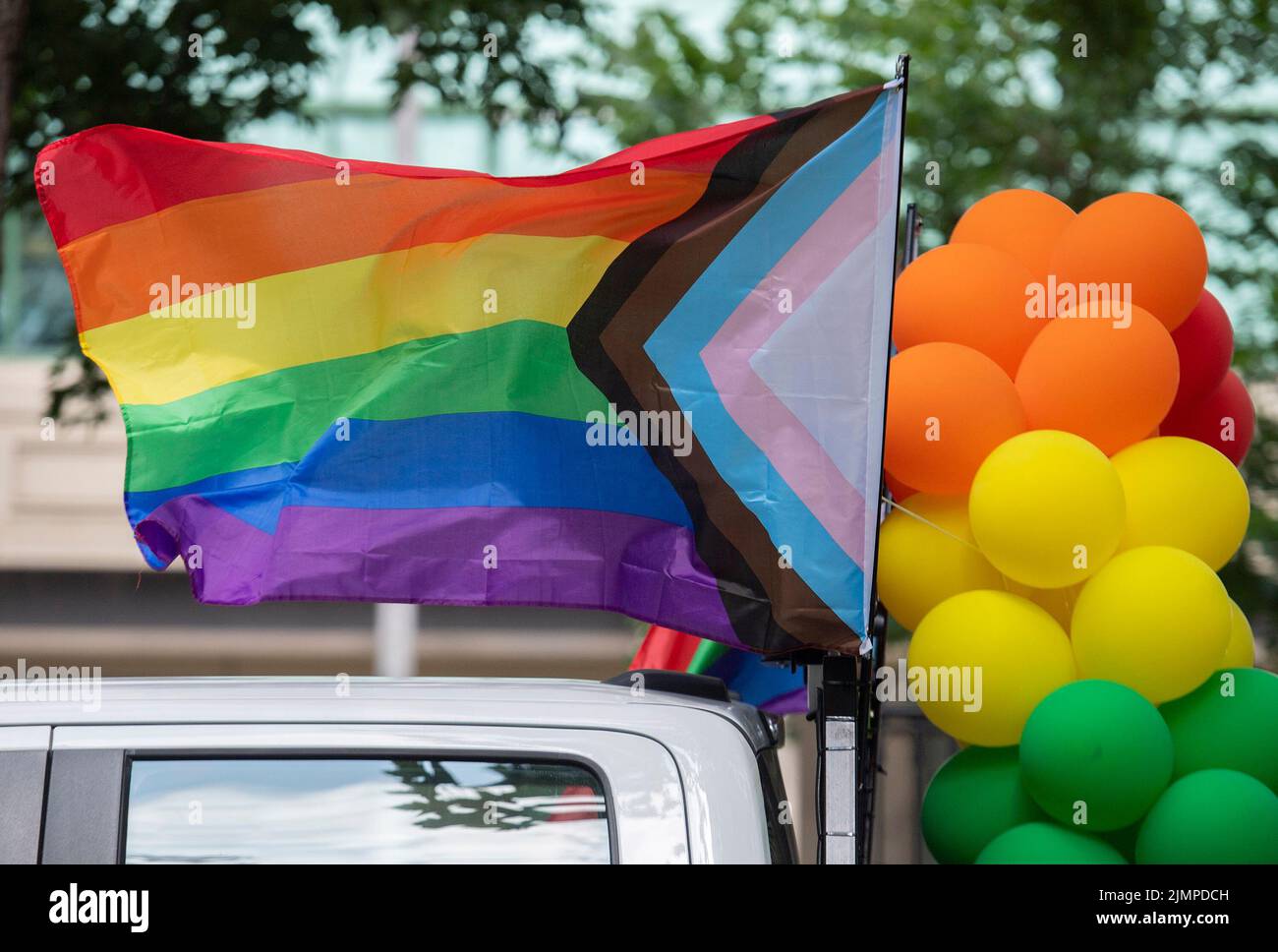 Rainbow Flags And Coloured Balloons Are Shown At The Site Where The Montreal Pride Parade Was