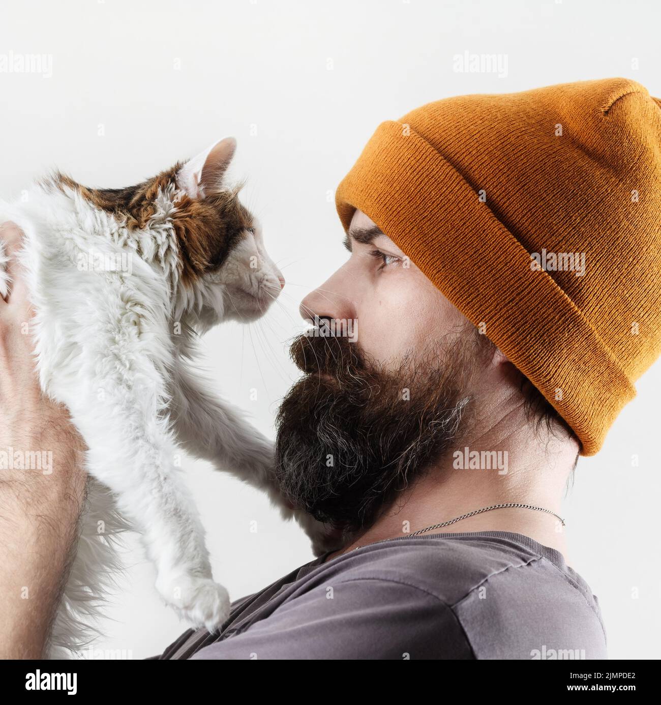 Man holding cat hi-res stock photography and images - Alamy