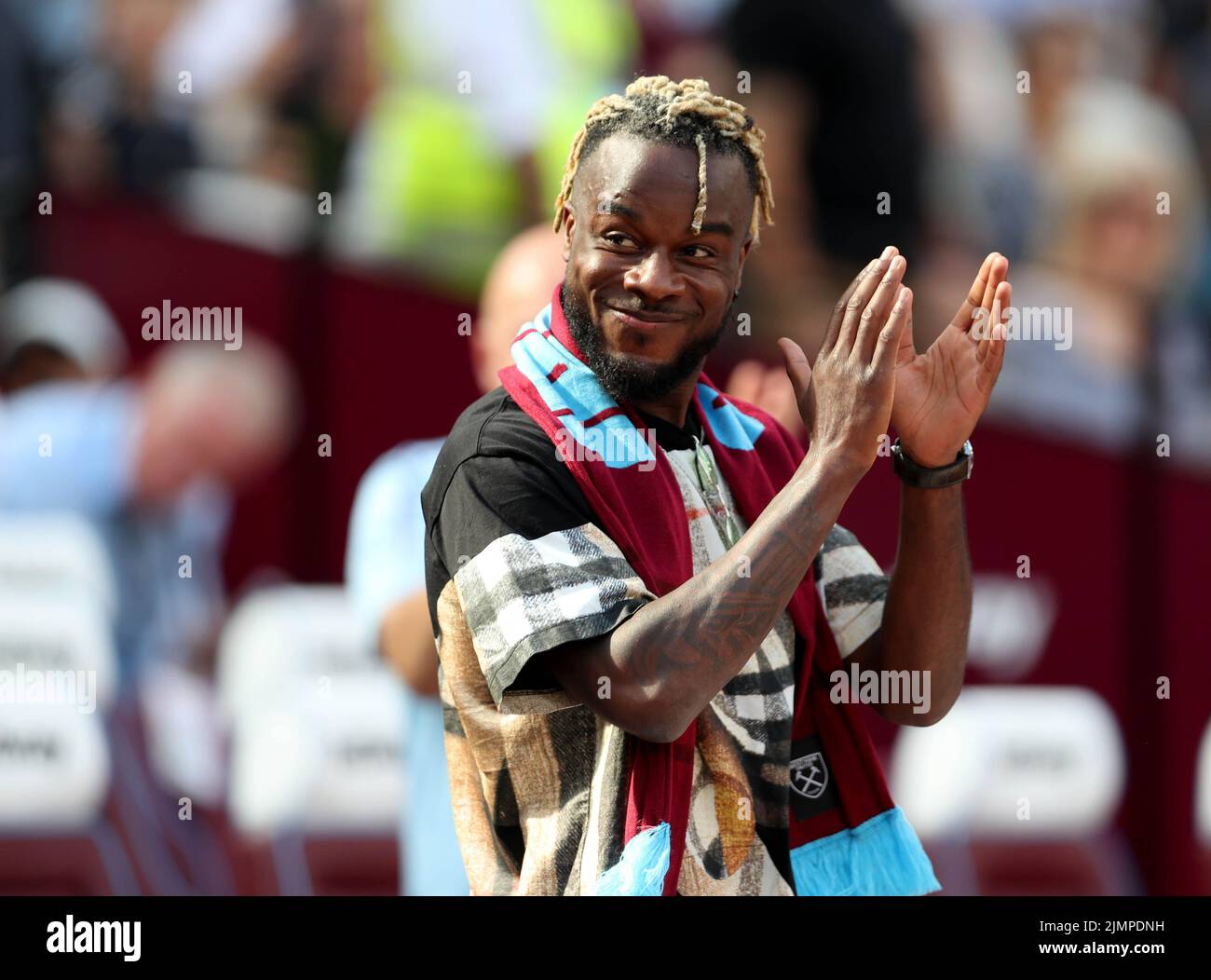 West Ham United's Maxwell Cornet is unveiled on the pitch after ...