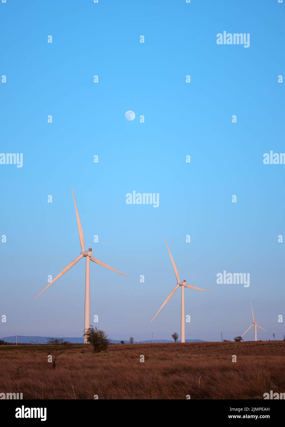 Wind power turbines in the countryside and the moon. West Lothian ...