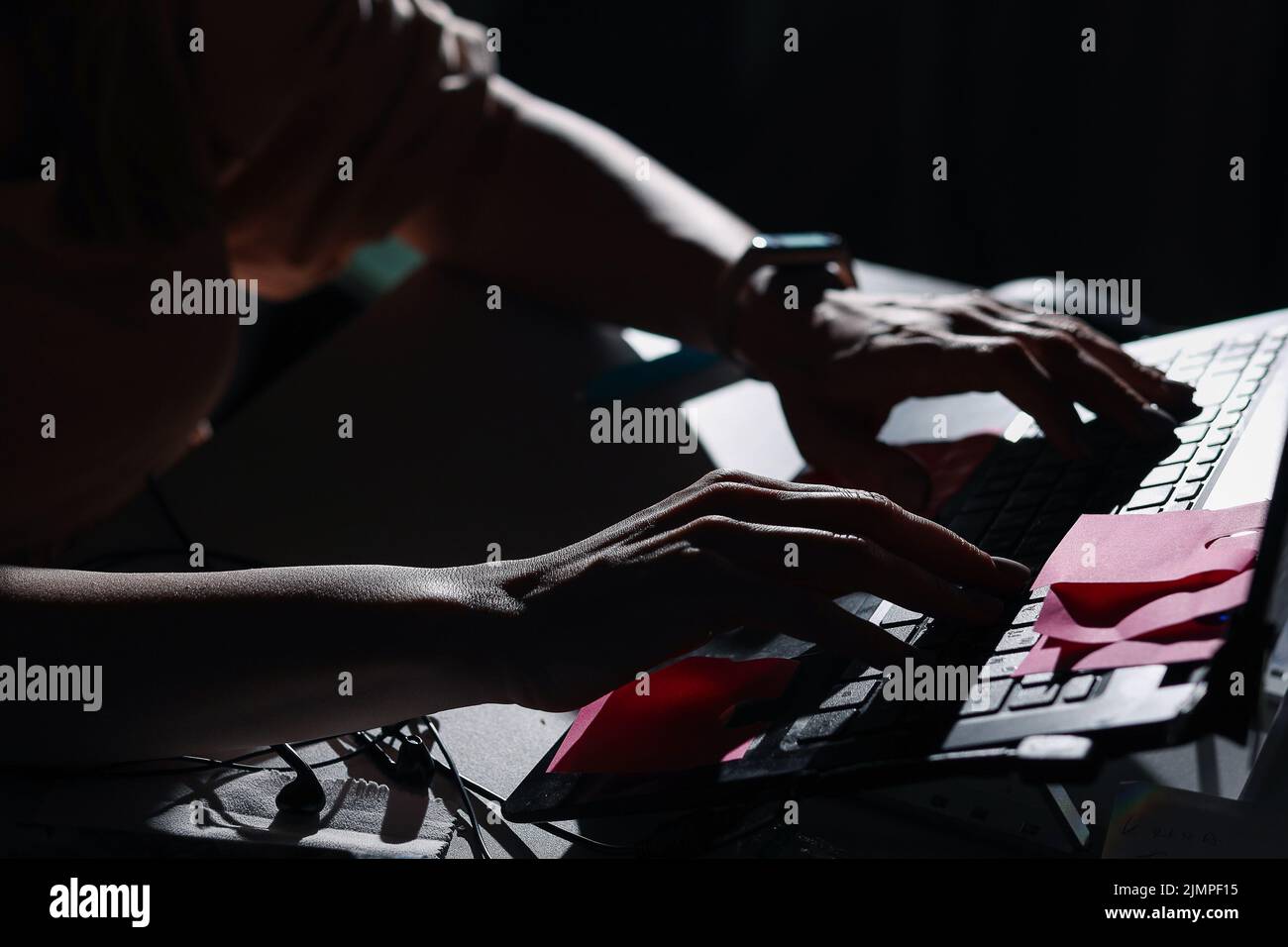 female cyber gamer playing online at night. cyber sport esports concept ...