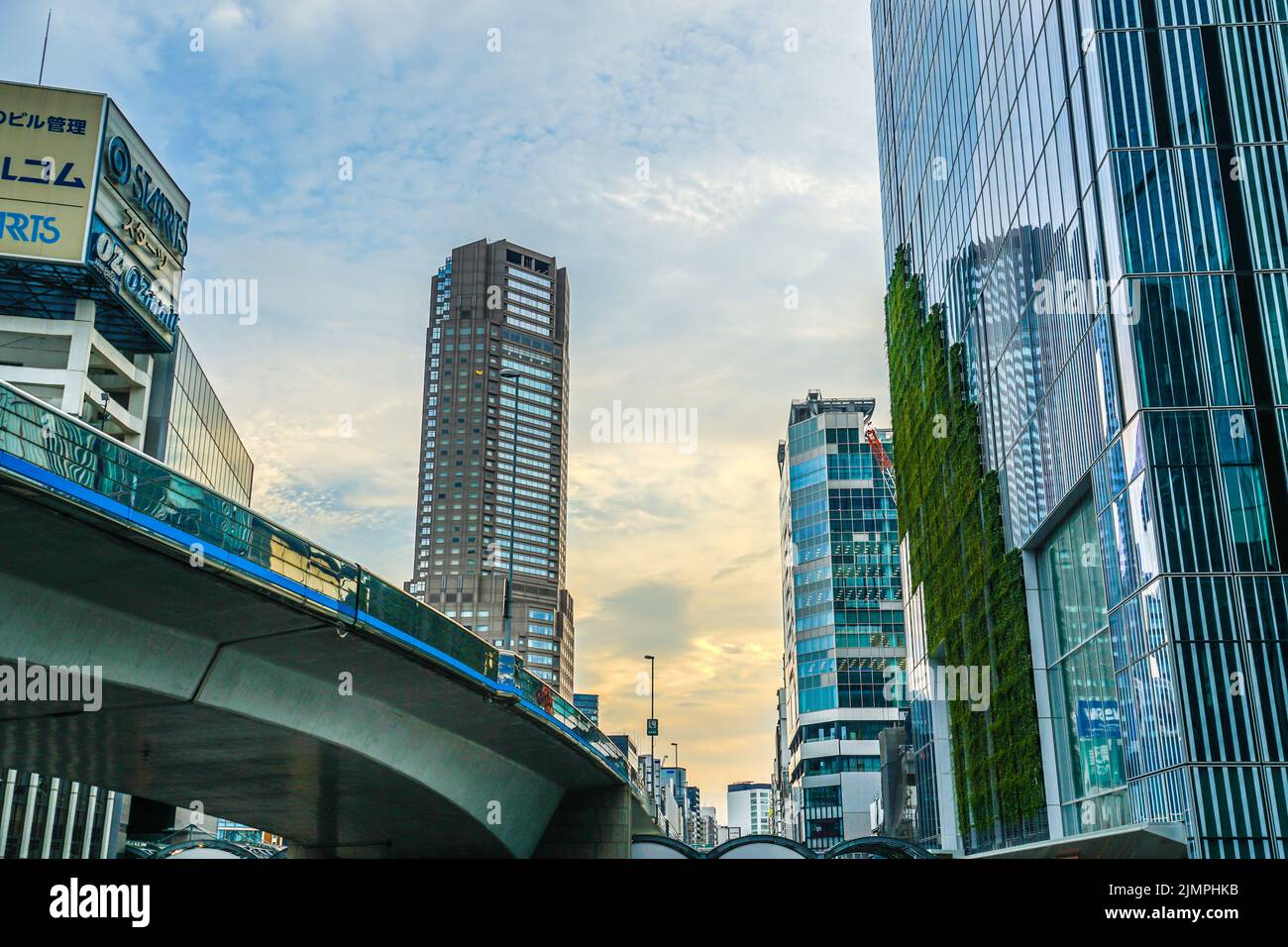 Shibuya of high-rise buildings and sky Stock Photo - Alamy