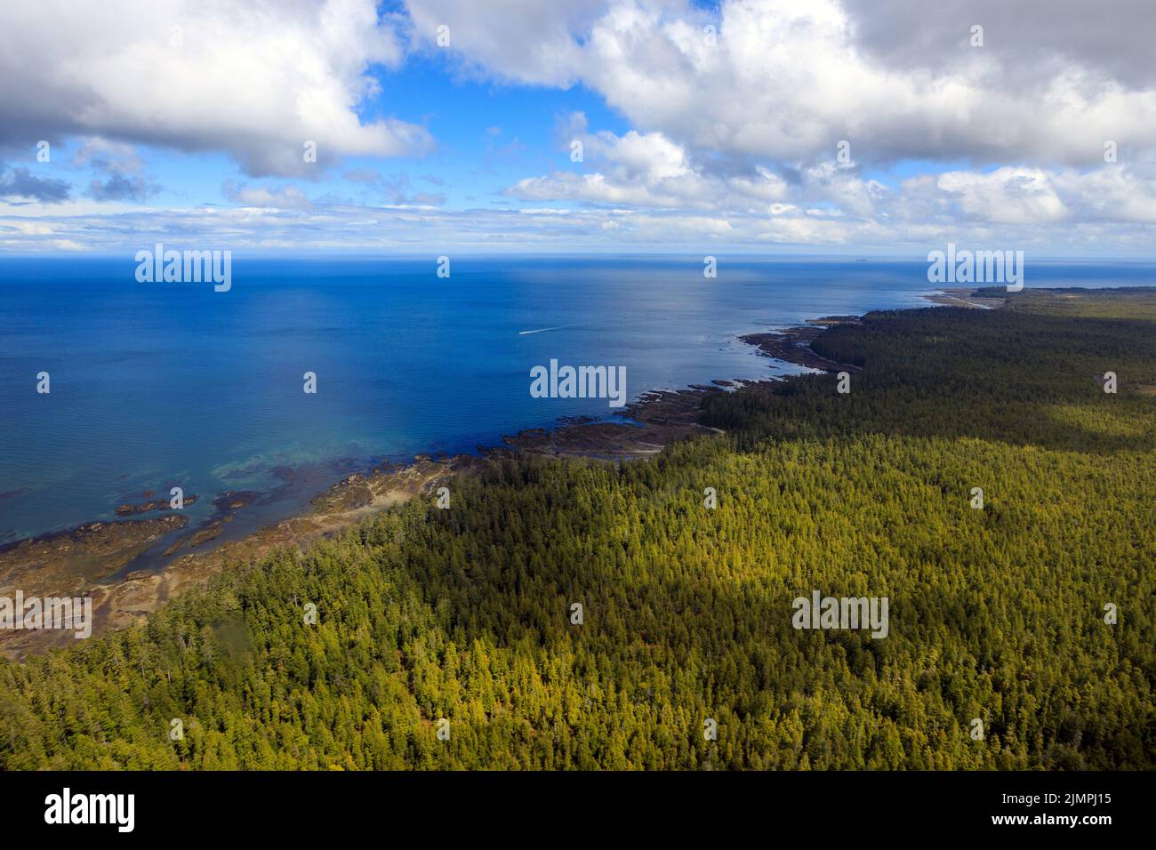 Aerial view from helicopter window over the ocean water in Haida Gwaii ...
