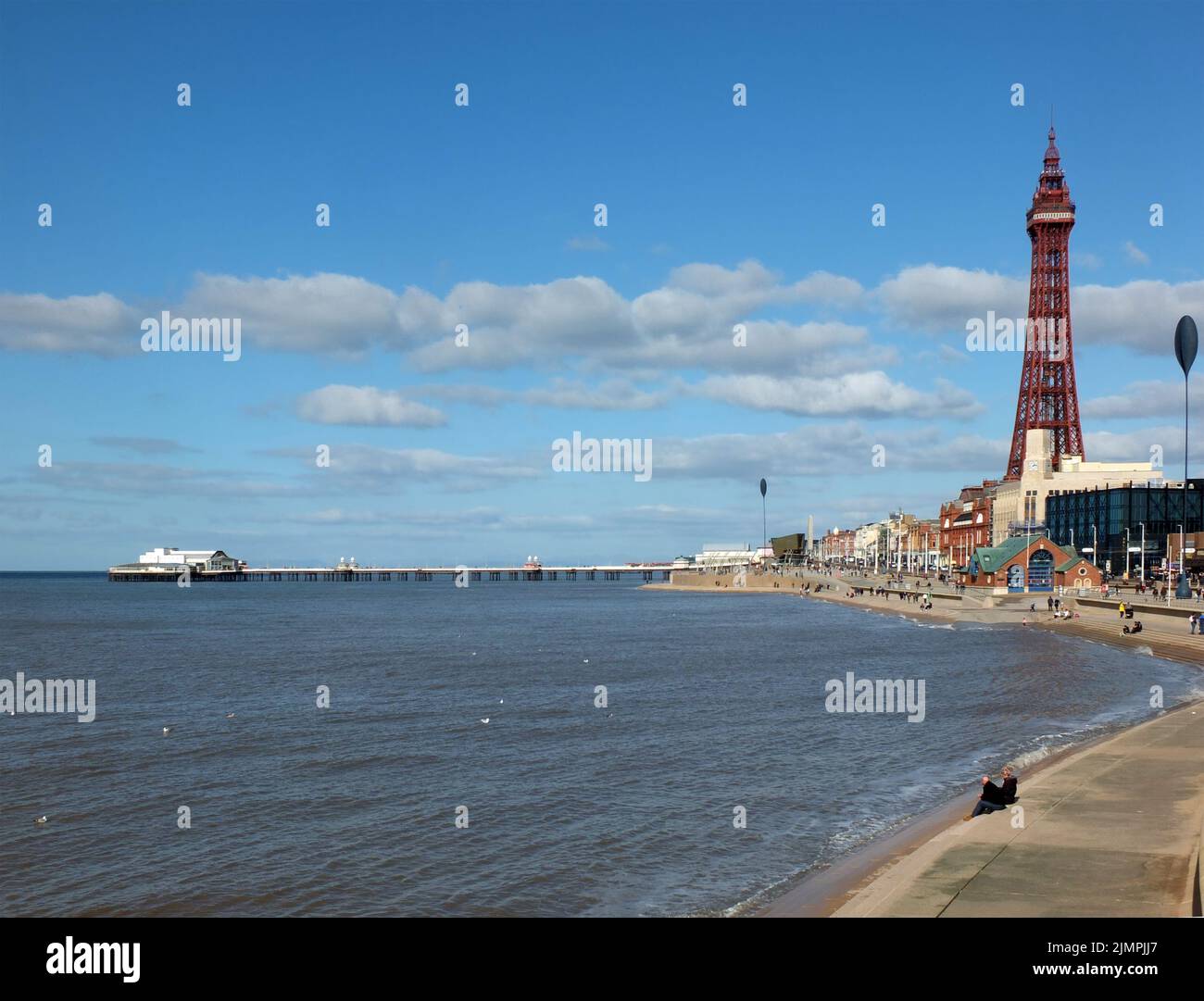 View of of blackpool with the north pier buildings and tower reflected ...