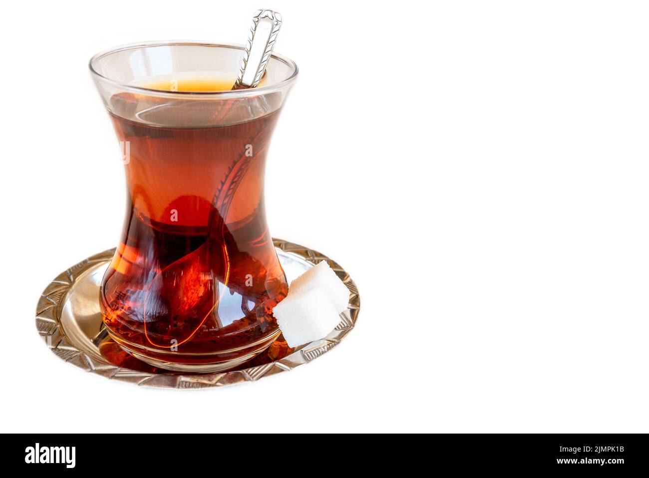 Turkish tea with sugar cubes on white background Stock Photo - Alamy