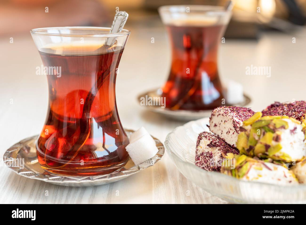 Traditional style turkish tea cup with turkish delay on the table Stock ...