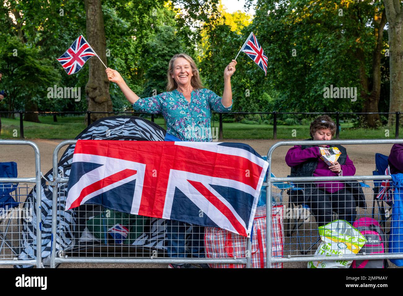 A British Woman Waves Union Flags Before The the Queen's Birthday ...