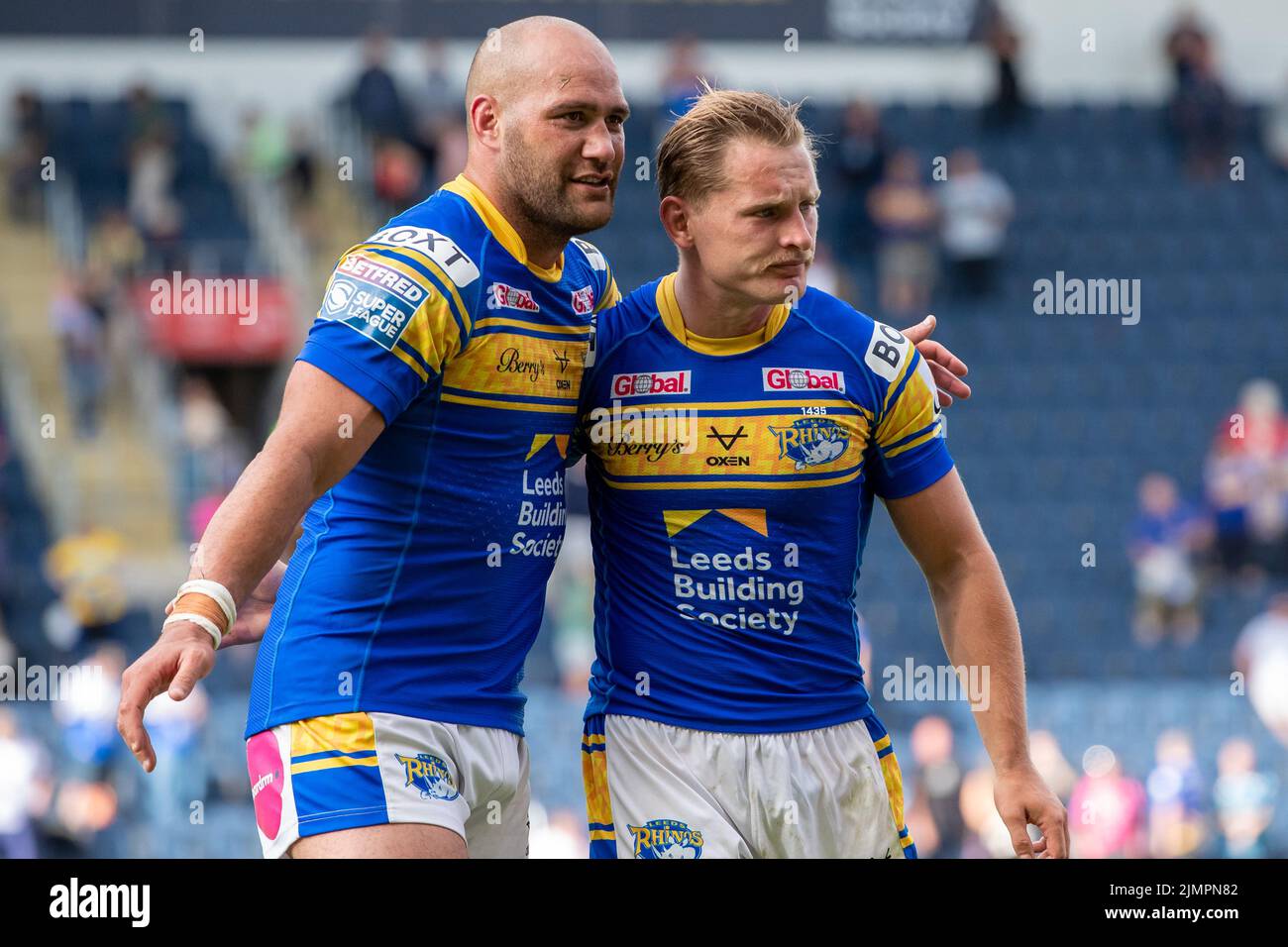 Bodene Thompson #19 and Brad Dwyer #14 of Leeds Rhinos celebrate after ...