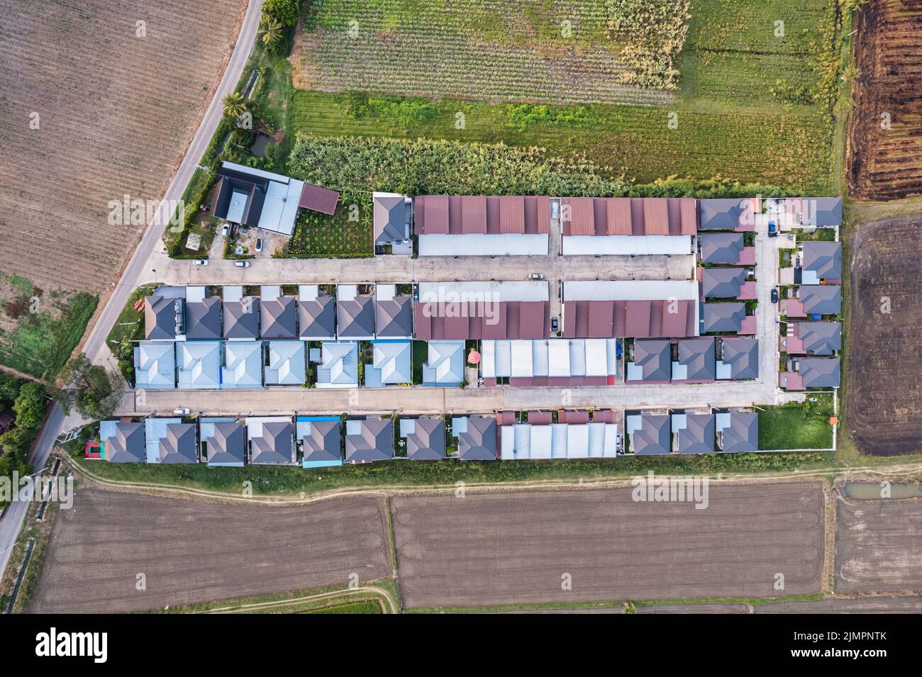 Aerial view of the roof of housing village among the nature in ...