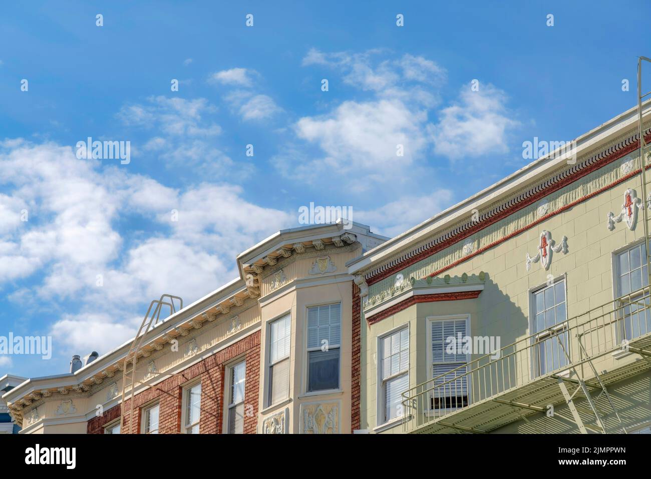 Slanted view of flat roofs of complex residential buildings with ...
