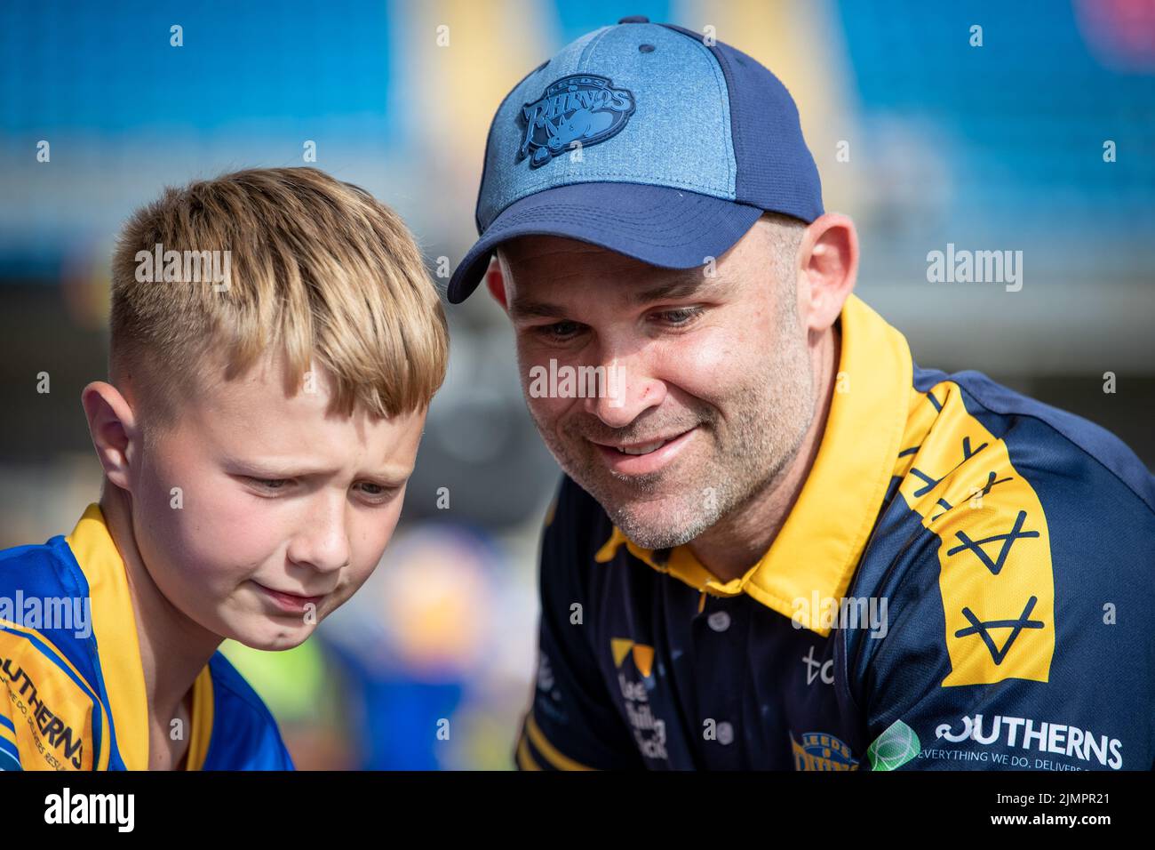 Rohan Smith Head Coach of Leeds Rhinos has a selfie with a fan after ...