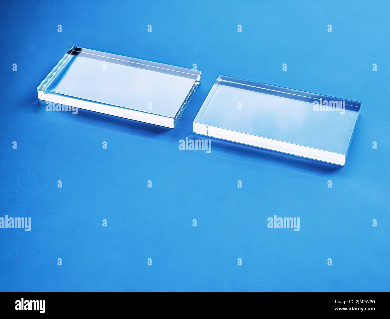 Glass device on blue background, future technology and abstract screen ...