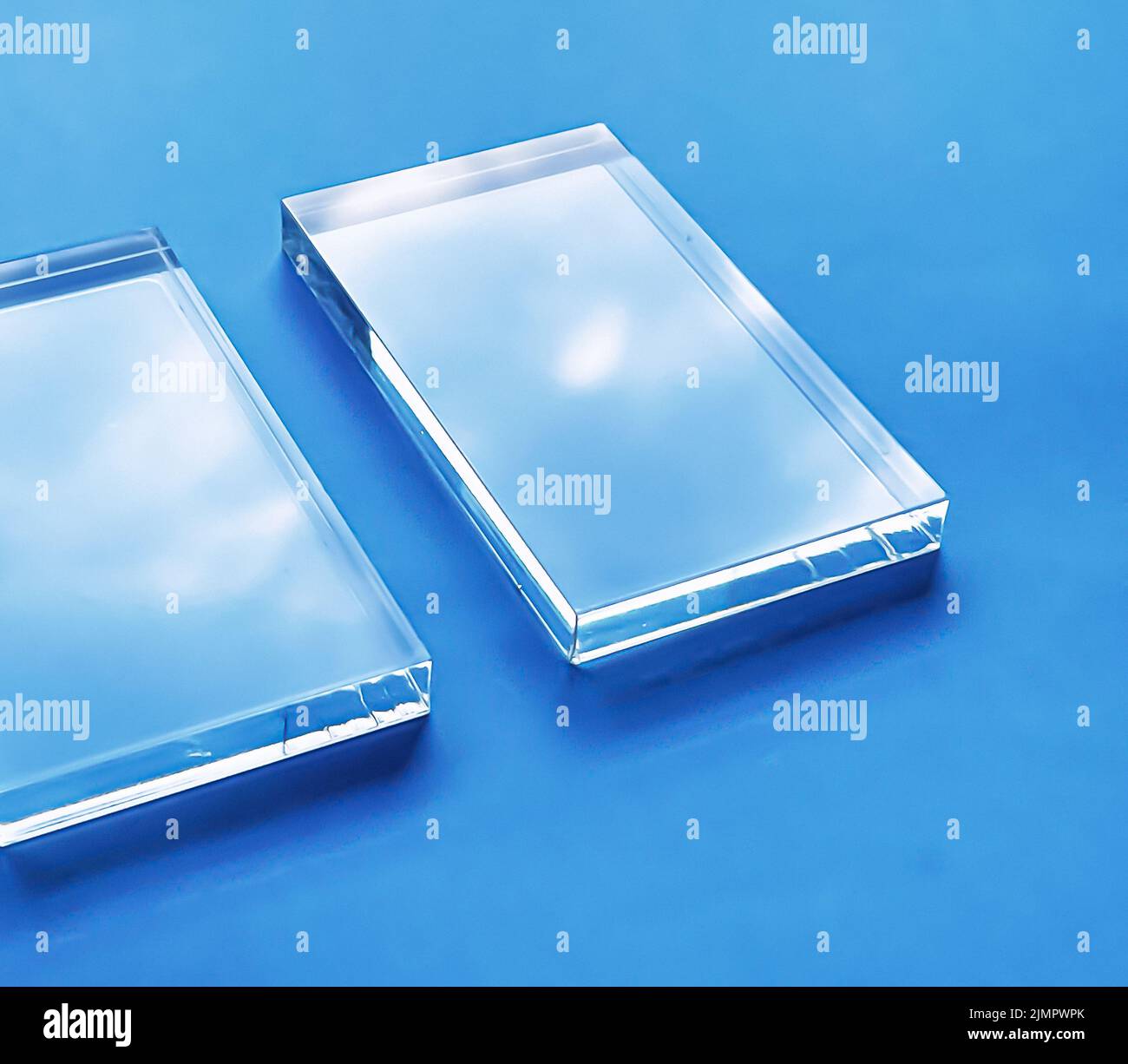 Glass device on blue background, future technology and abstract screen ...