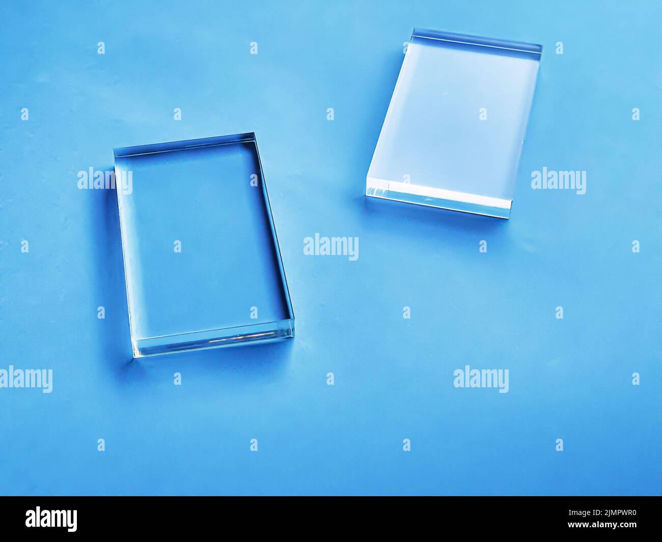 Glass device on blue background, future technology and abstract screen ...