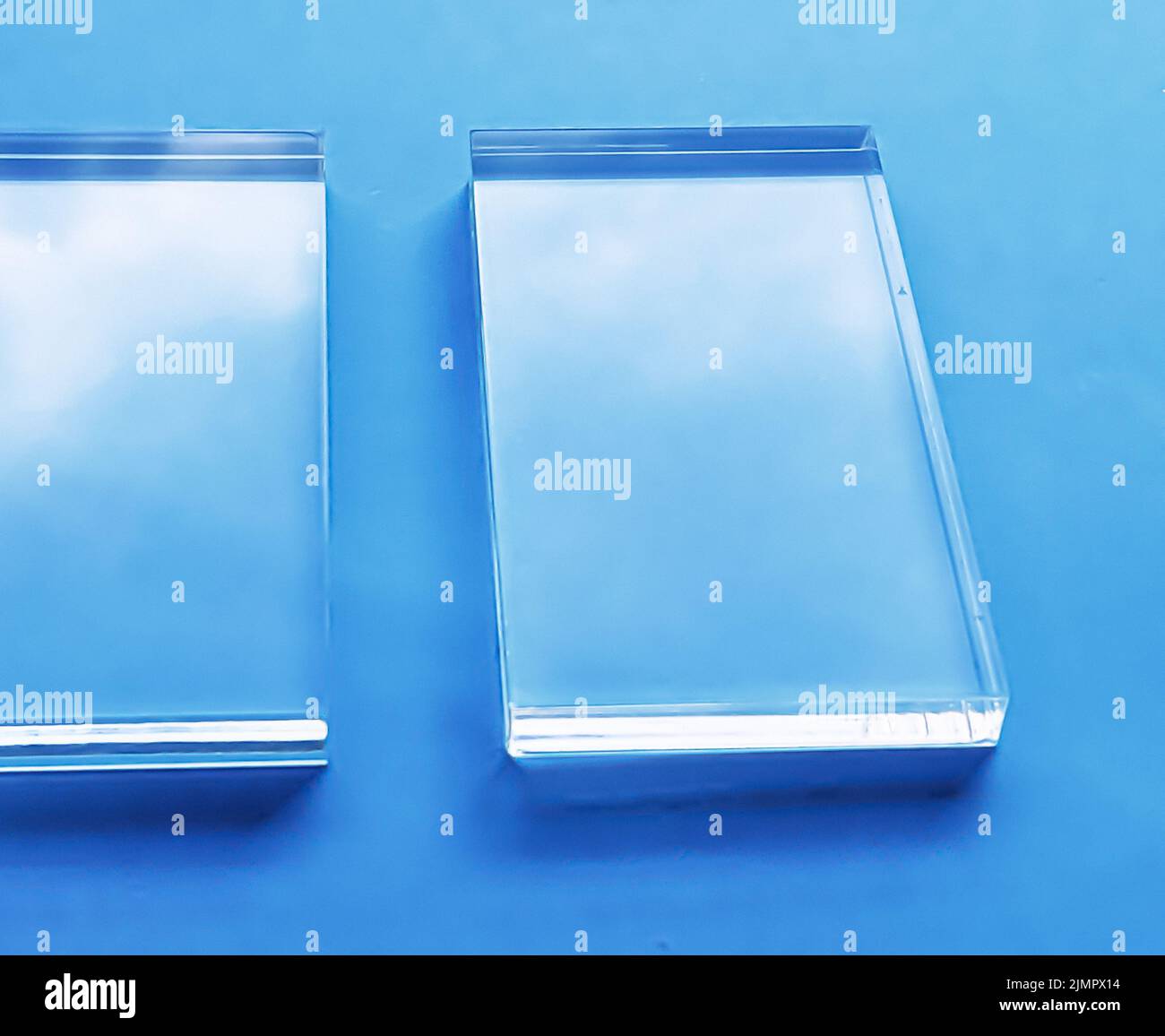 Glass device on blue background, future technology and abstract screen ...