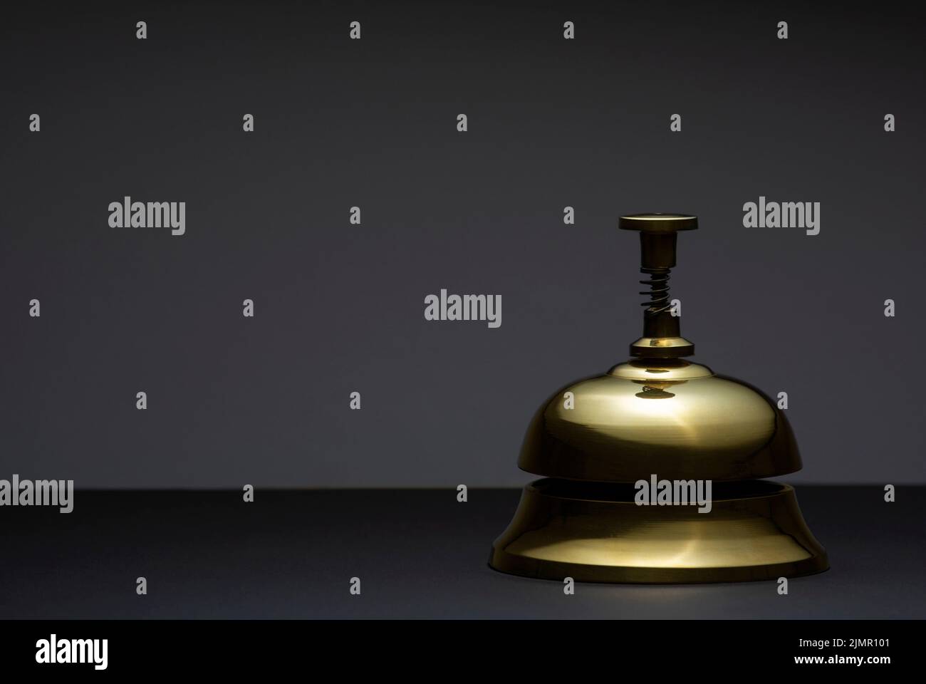 Reception bell on dark background Stock Photo - Alamy