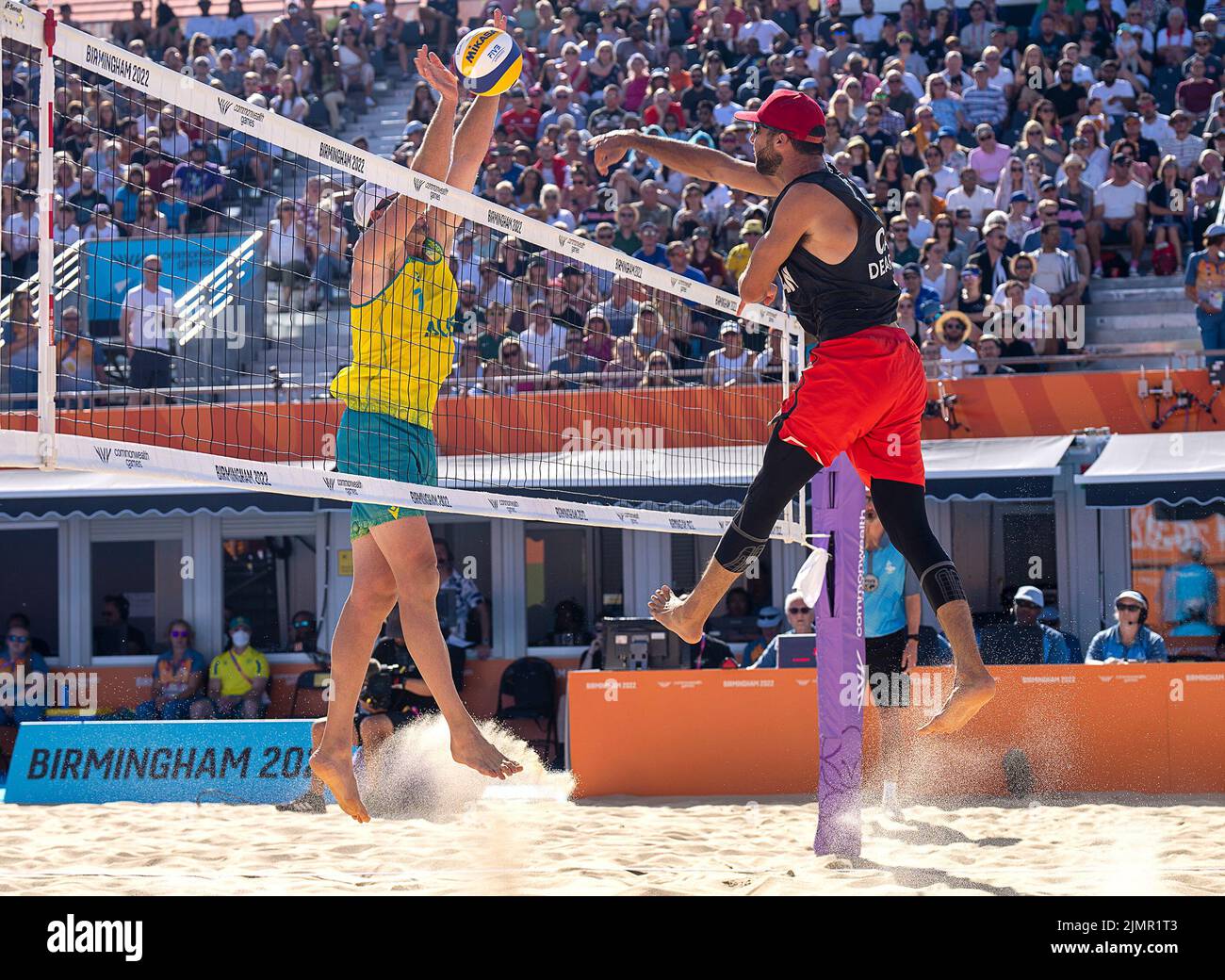 Canada's Dan Dearing, right, returns the ball against Australia's Chris ...