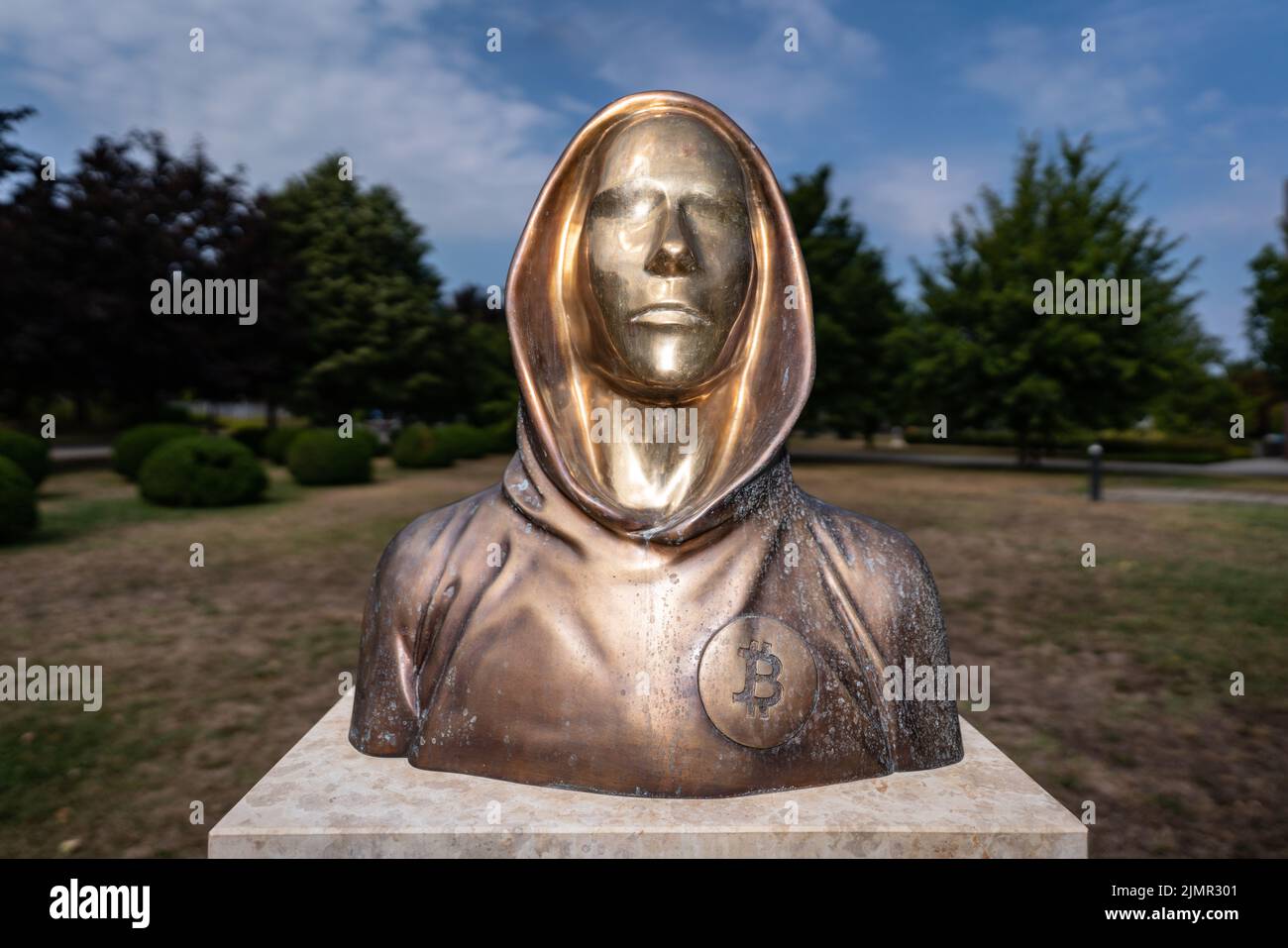 Budapest, Hungary -August 7, .2022: Portrait of the statue of Satoshi Nakamoto mysterious ...