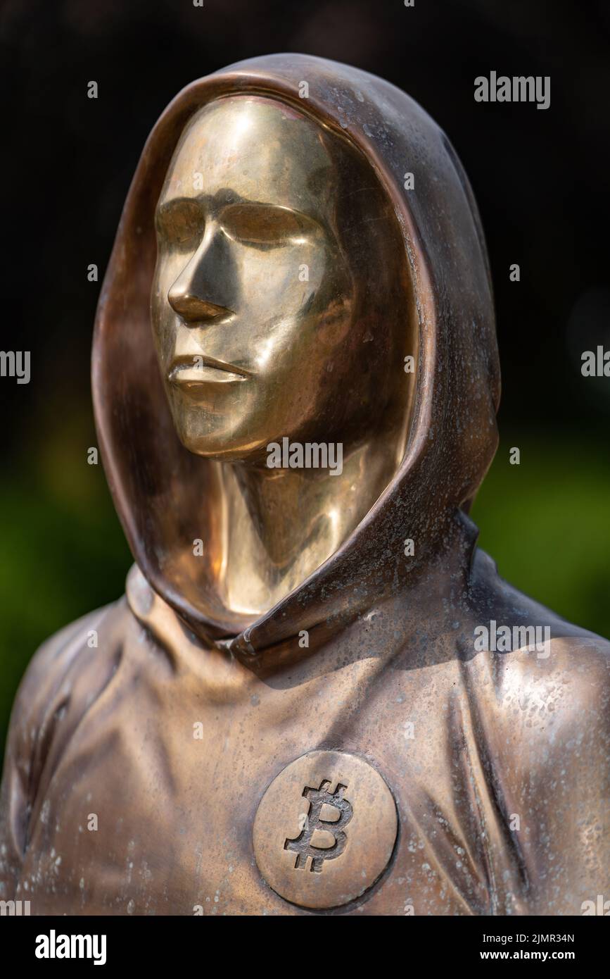 Budapest, Hungary -August 7, .2022: Portrait of the statue of Satoshi ... Budapest, Hungary -August 7, .2022: Portrait of the statue of Satoshi ...