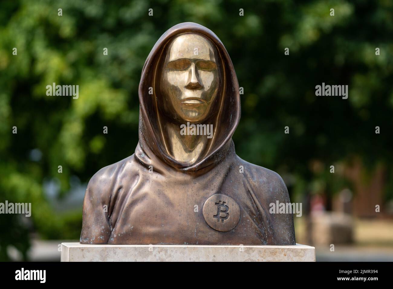 Budapest, Hungary -August 7, .2022: Portrait of the statue of Satoshi Nakamoto mysterious ...