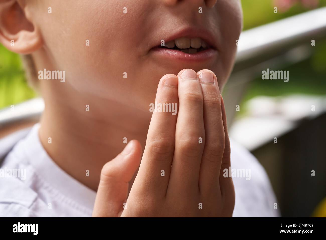Fingers of a little boy practicing EFT or emotional freedom technique ...