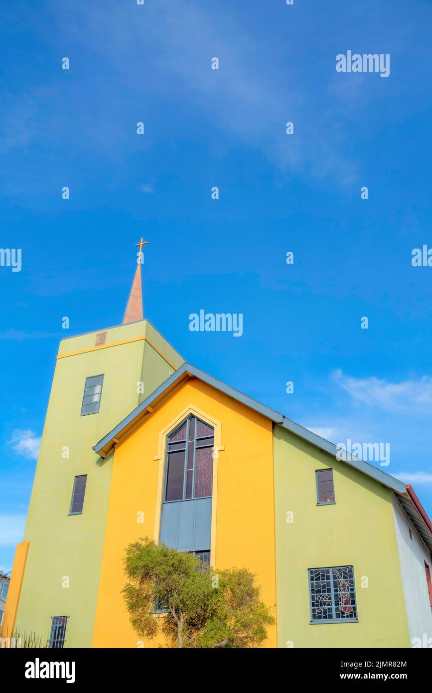 Church exterior with yellow and light green wall exterior in San ...