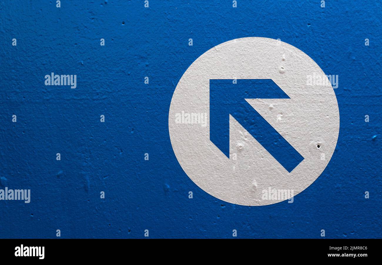 Large White Arrow On A Blue Background