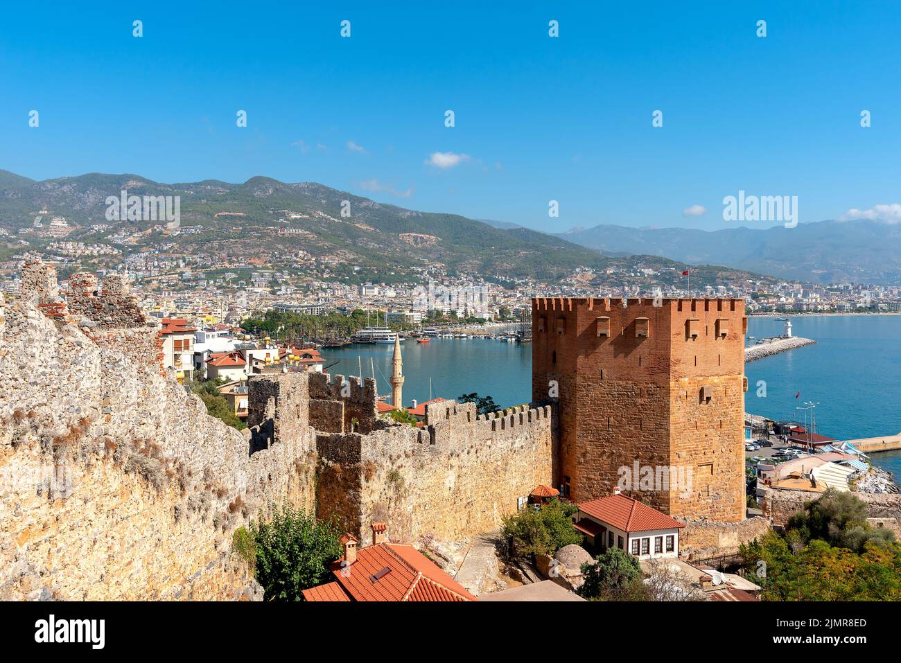 View of the resort town of Alanya, the Red Tower on the shores of the ...