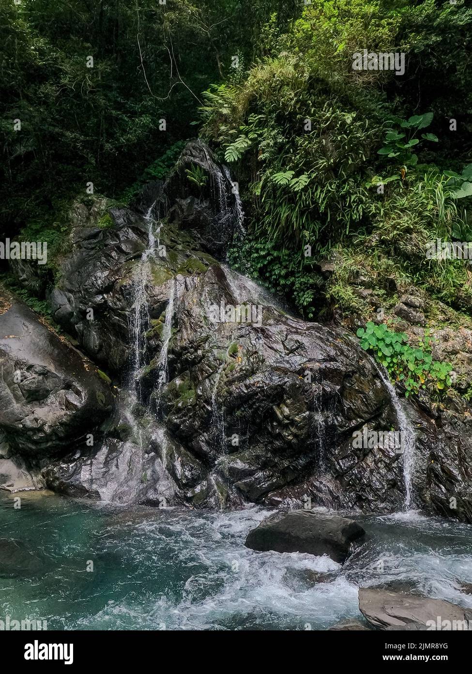 Small waterfall flowing into stream in Wulai, Taipei Stock Photo - Alamy
