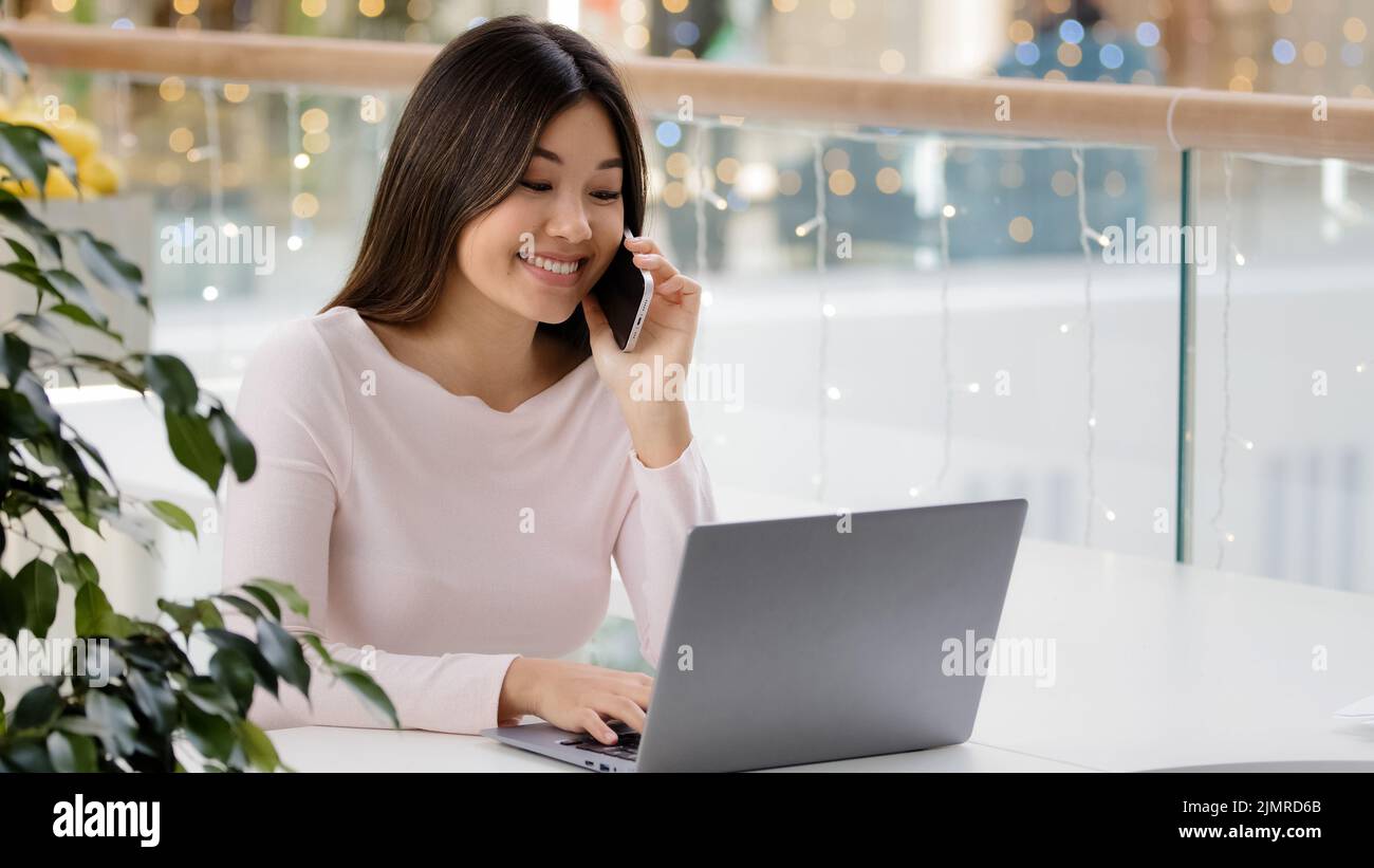 Happy Asian Korean woman freelancer student businesswoman holding ...