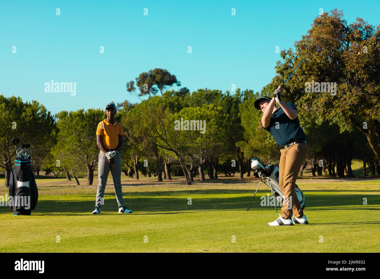 African man playing golf hi-res stock photography and images - Alamy