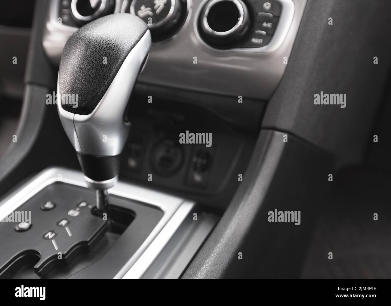Detail of an automatic gear shifter in a new, modern car Stock Photo ...