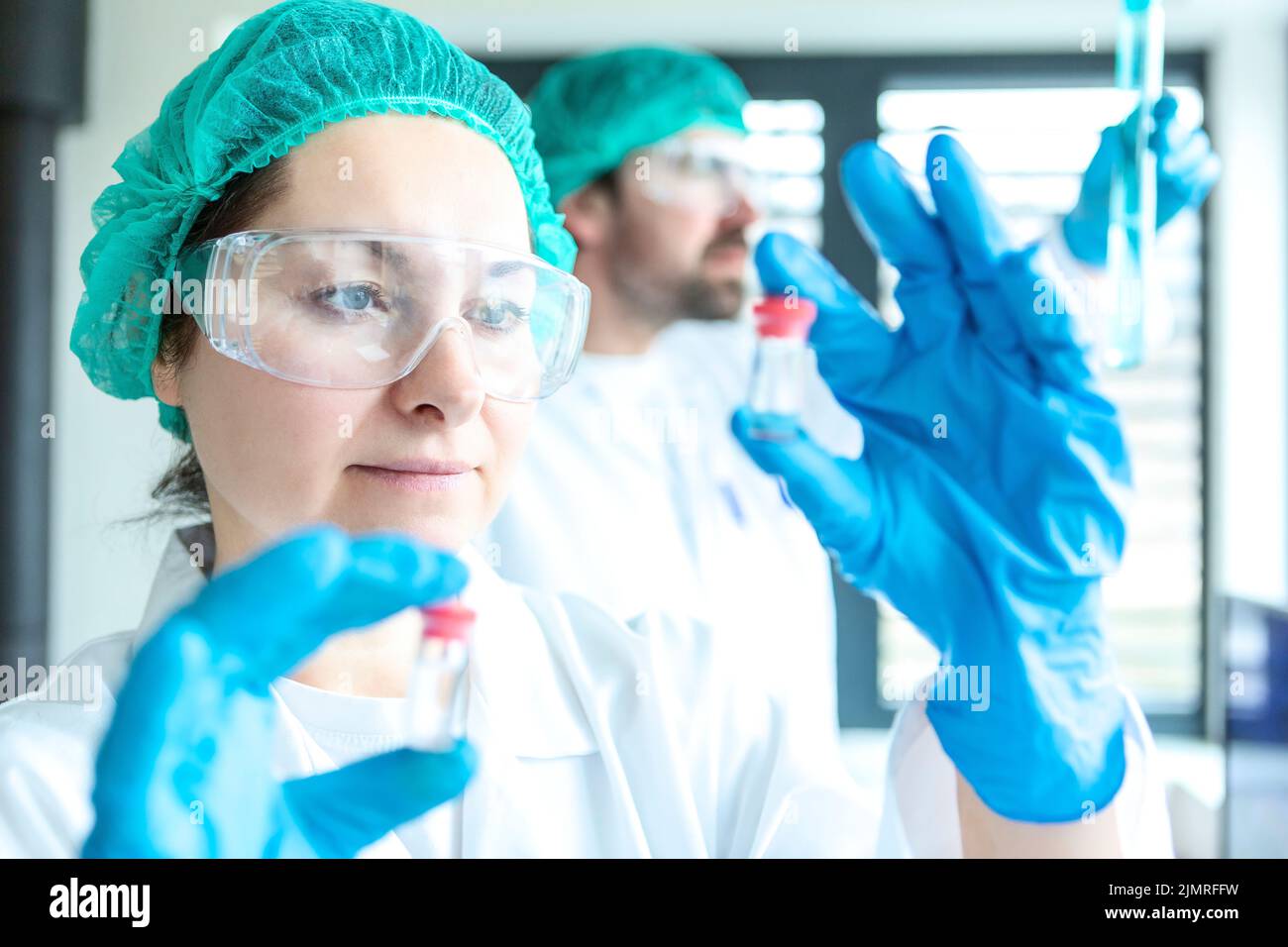 Scientists in a modern lab Stock Photo - Alamy