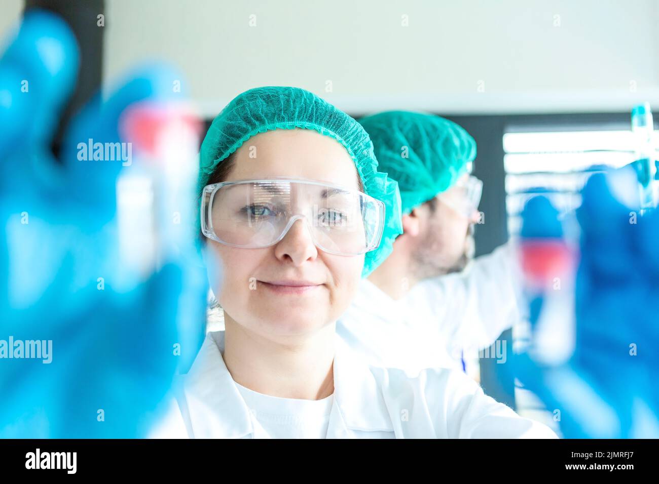Scientists in a modern lab Stock Photo - Alamy