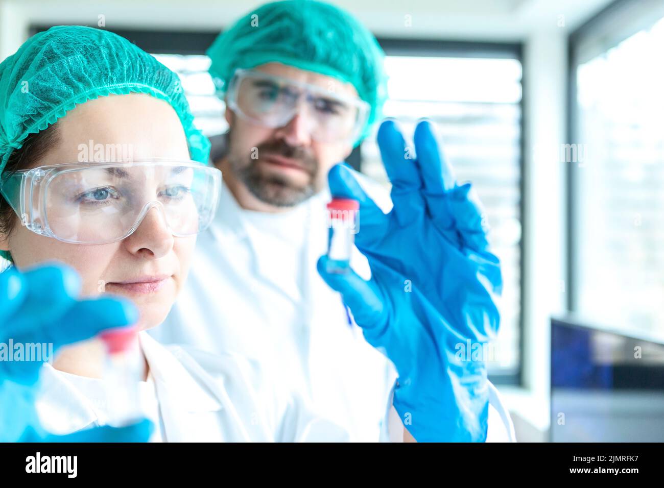 Scientists in a modern lab Stock Photo - Alamy