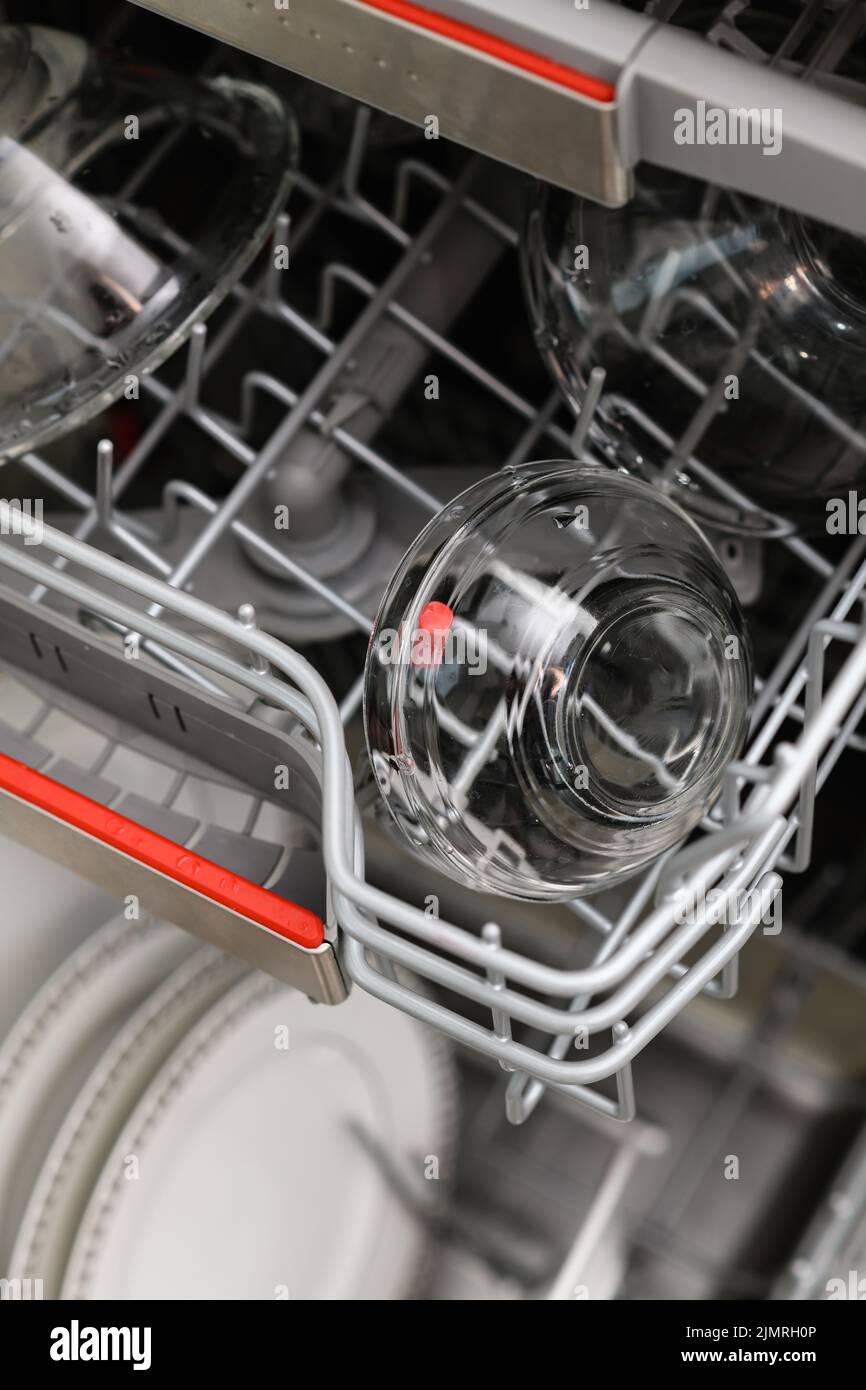 Clean dishes in the dishwasher close-up. Top view Stock Photo - Alamy