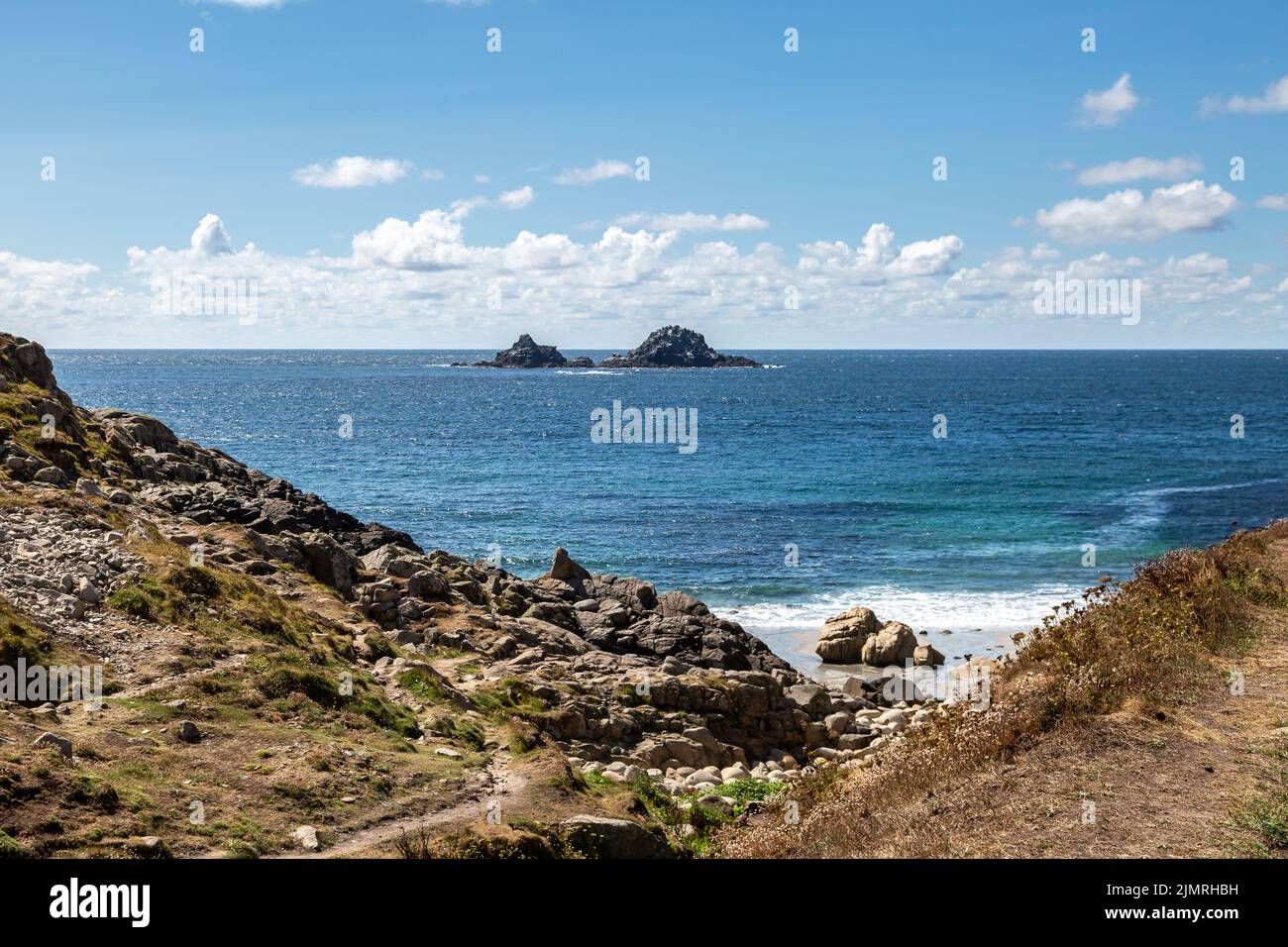 A view of The Brisons from above Porth Nanven beach, on the west of ...