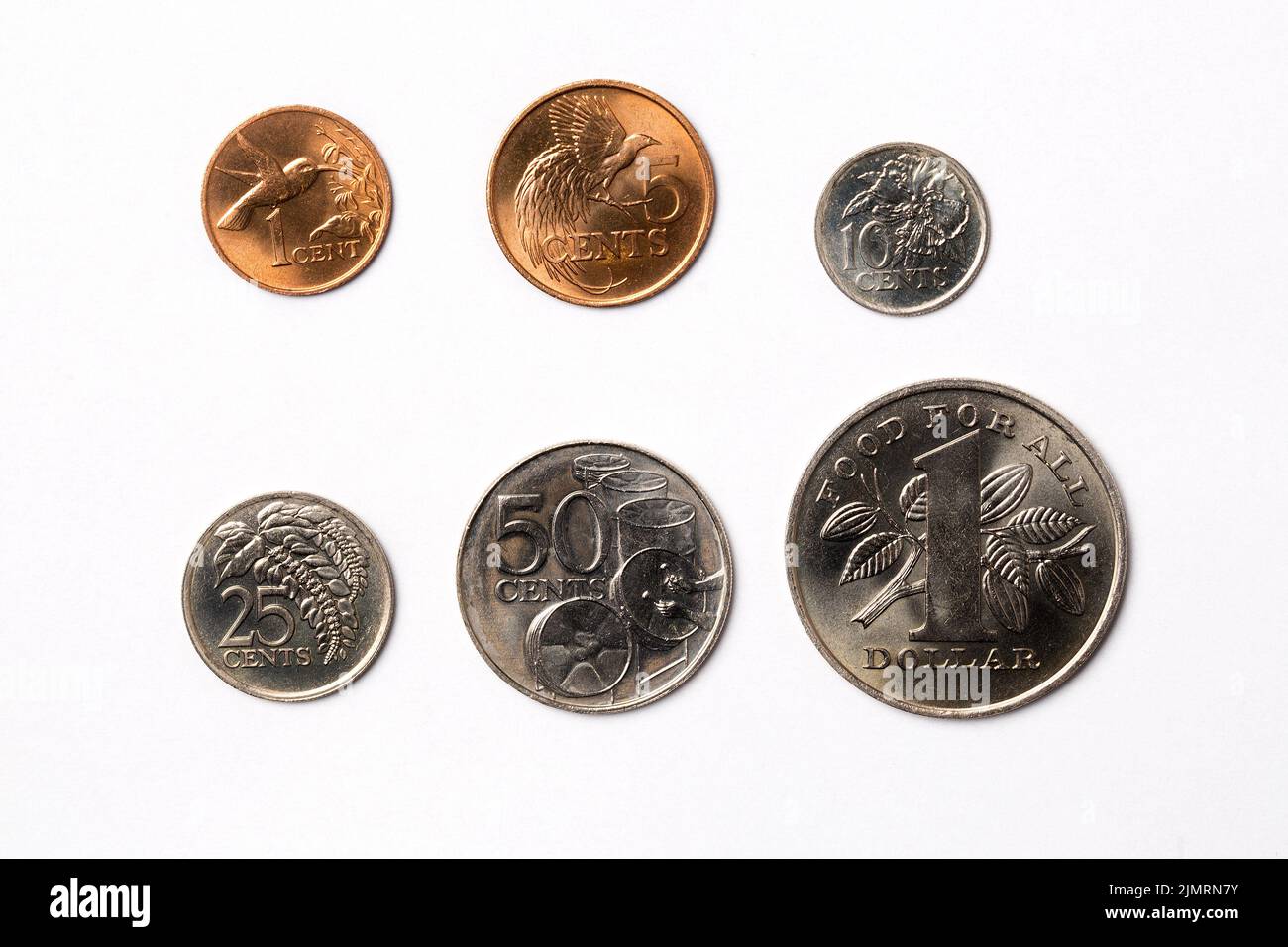 Coins from Trinidad and Tobago on a white background Stock Photo - Alamy