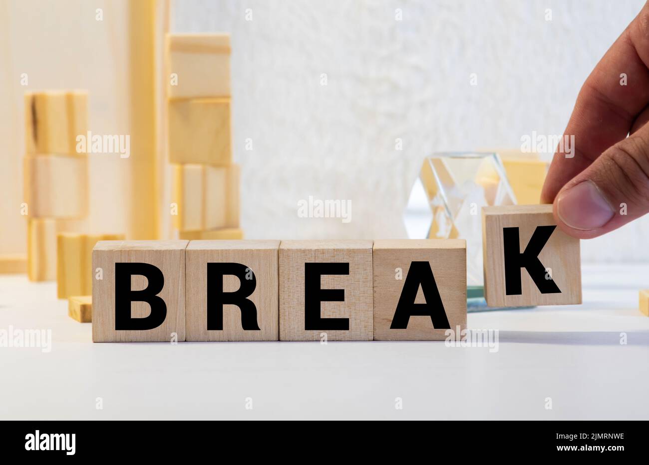 word break written with wood cubes on black background. Bird view Stock ...