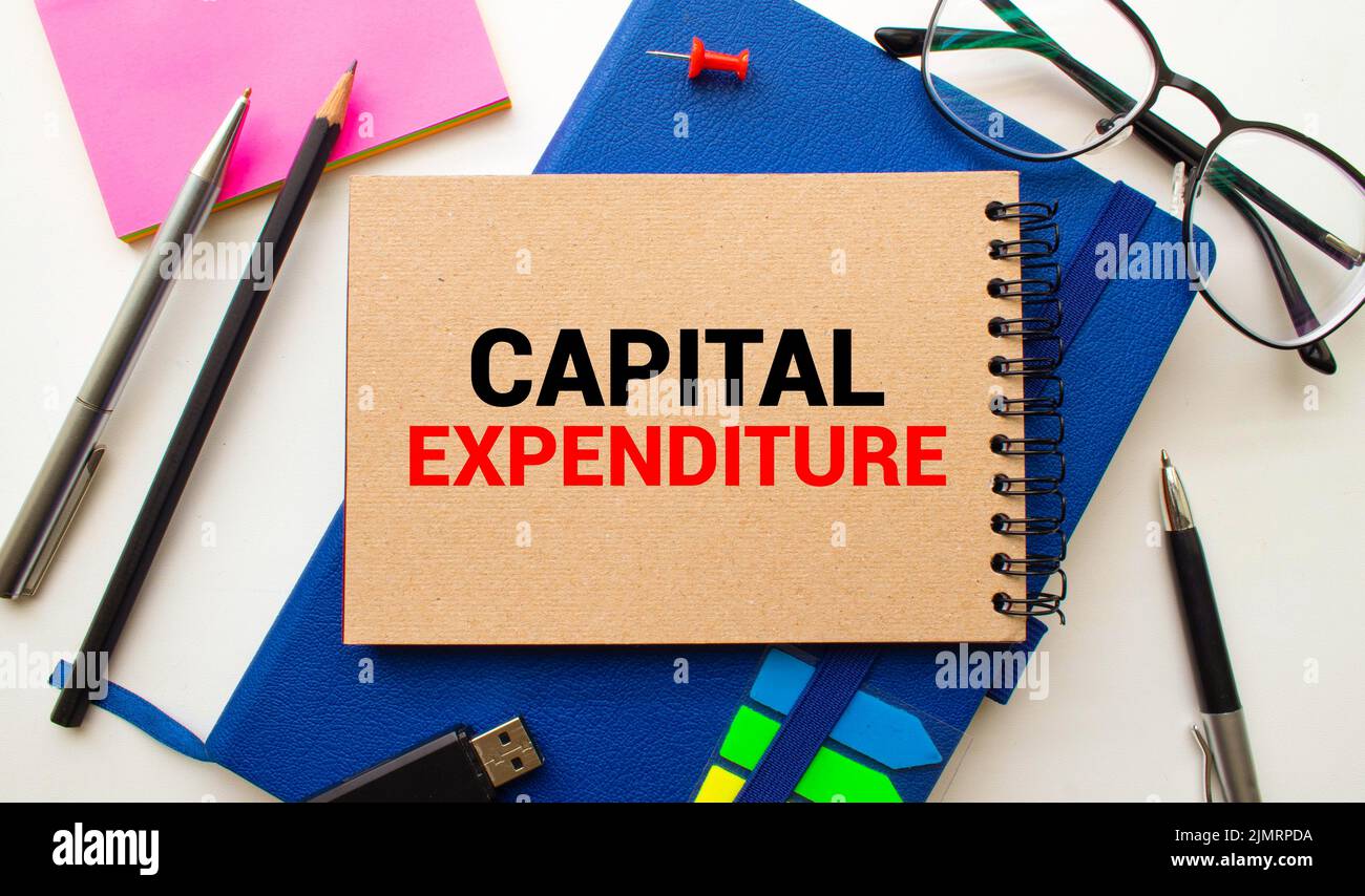 text Capital Expenditure on noteboock Stock Photo - Alamy