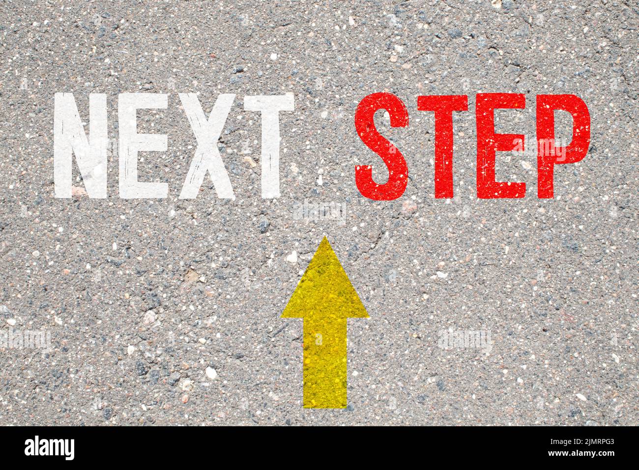 Next steps progress concept with chalk text and direction arrows on ...
