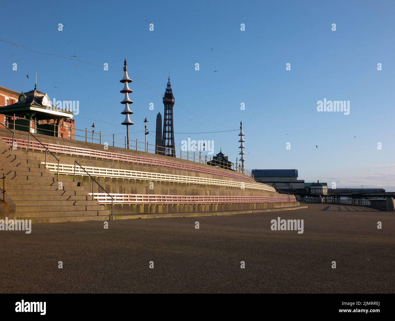 The pedestrian walkway near blackpool north pier with benches and ...