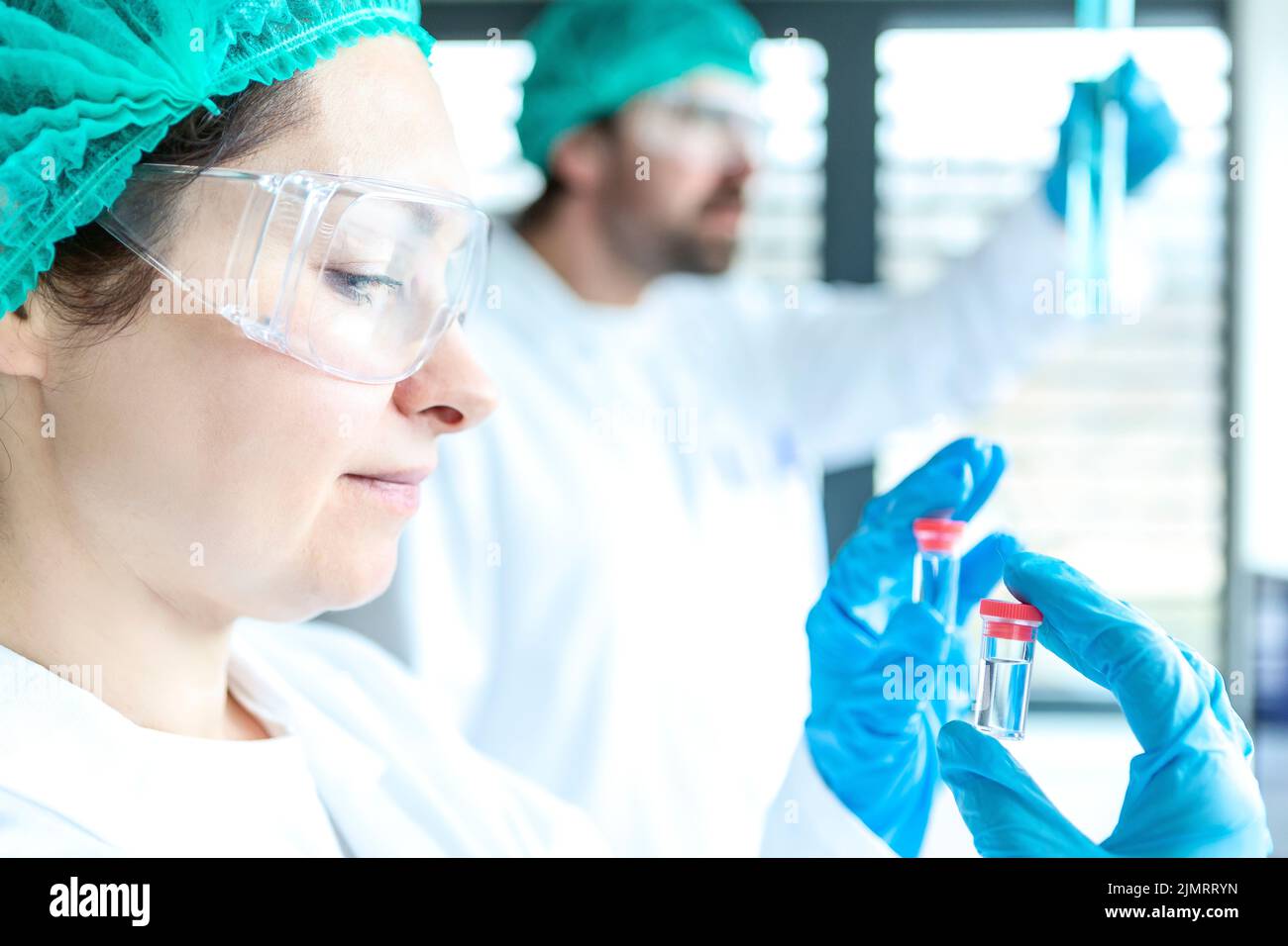 Scientists in a modern lab Stock Photo - Alamy
