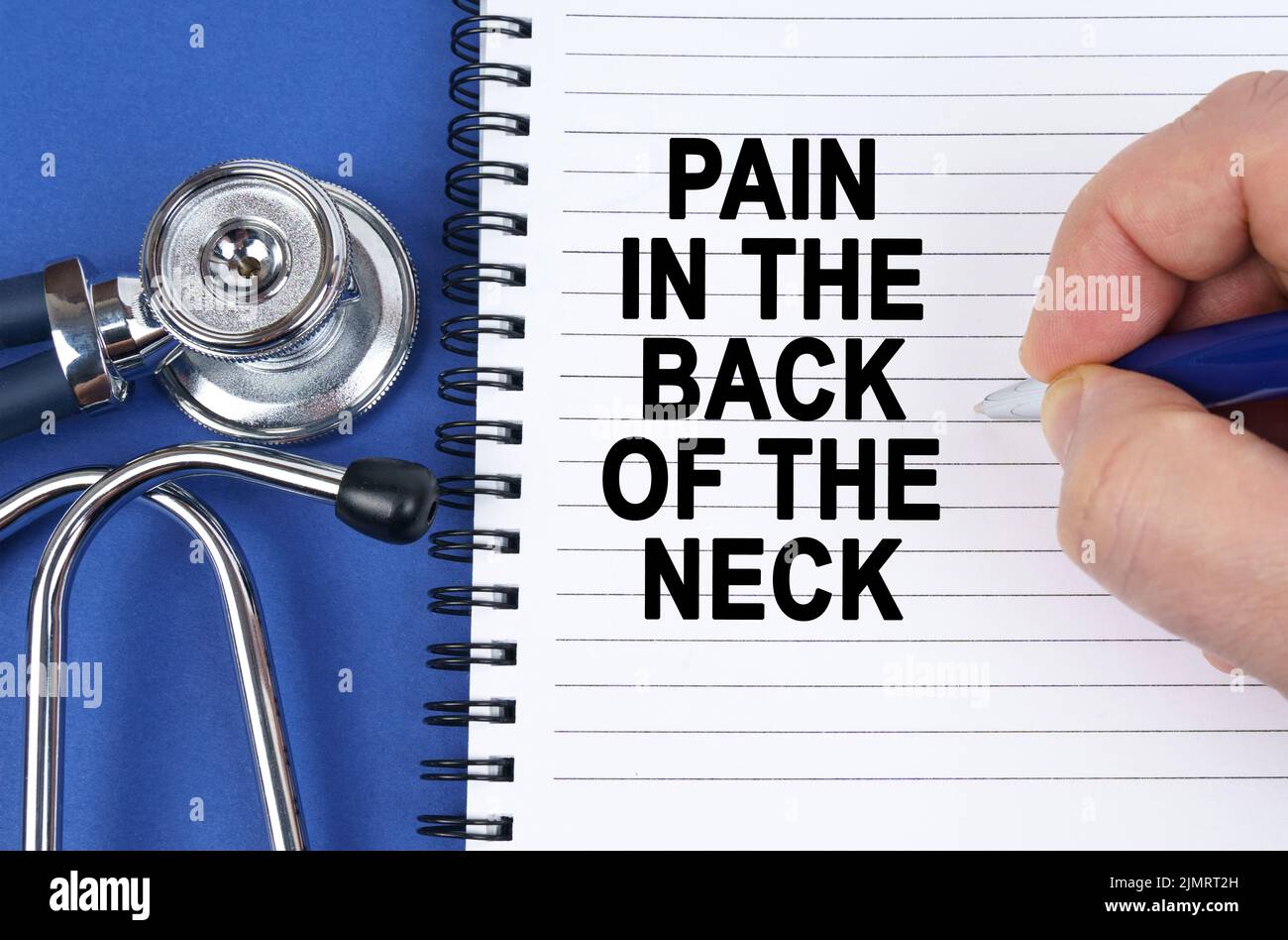 Medical concept. On a blue surface lies a stethoscope and a notebook in ...
