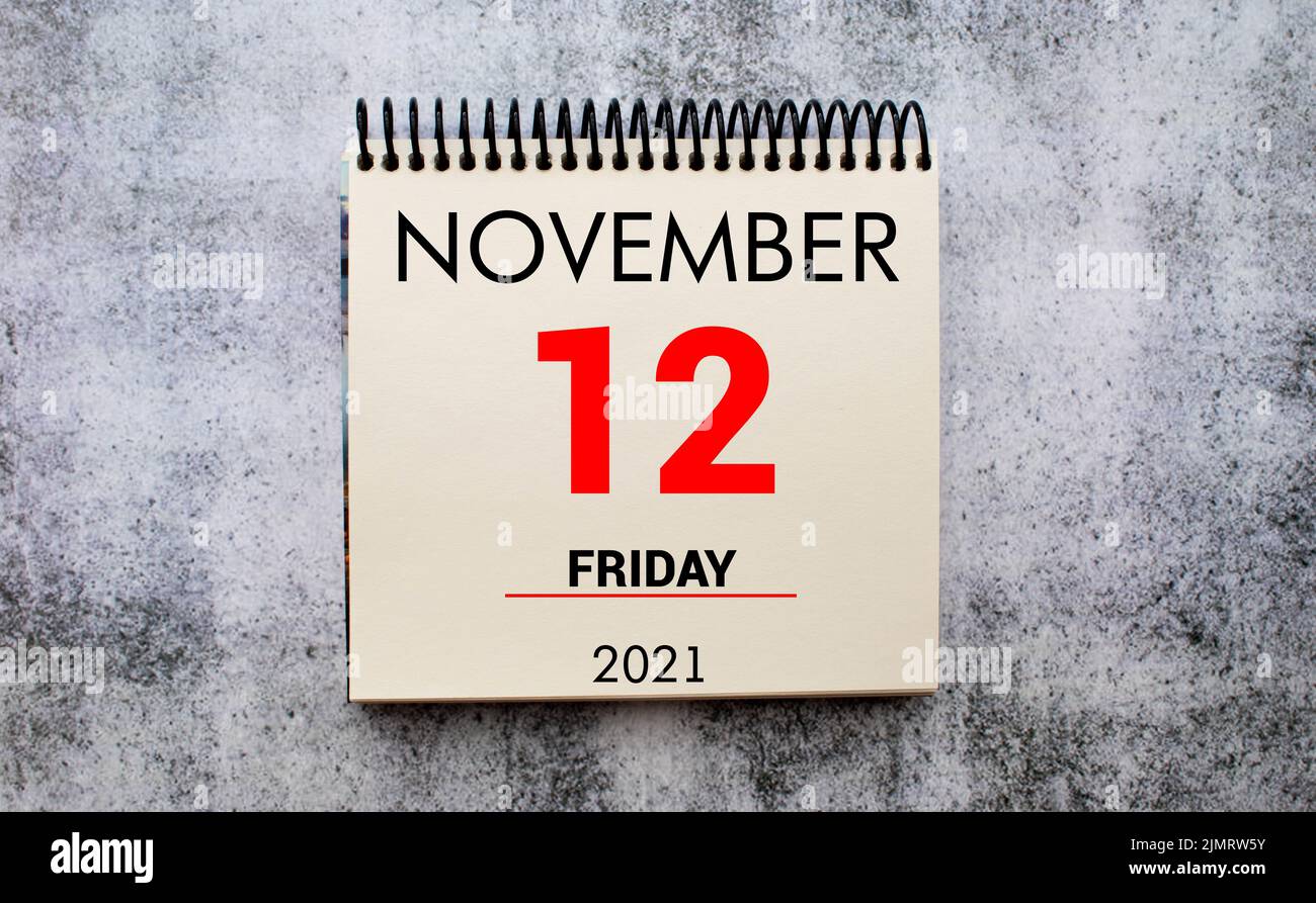 Wall calendar with a red pin - November 12 Stock Photo - Alamy