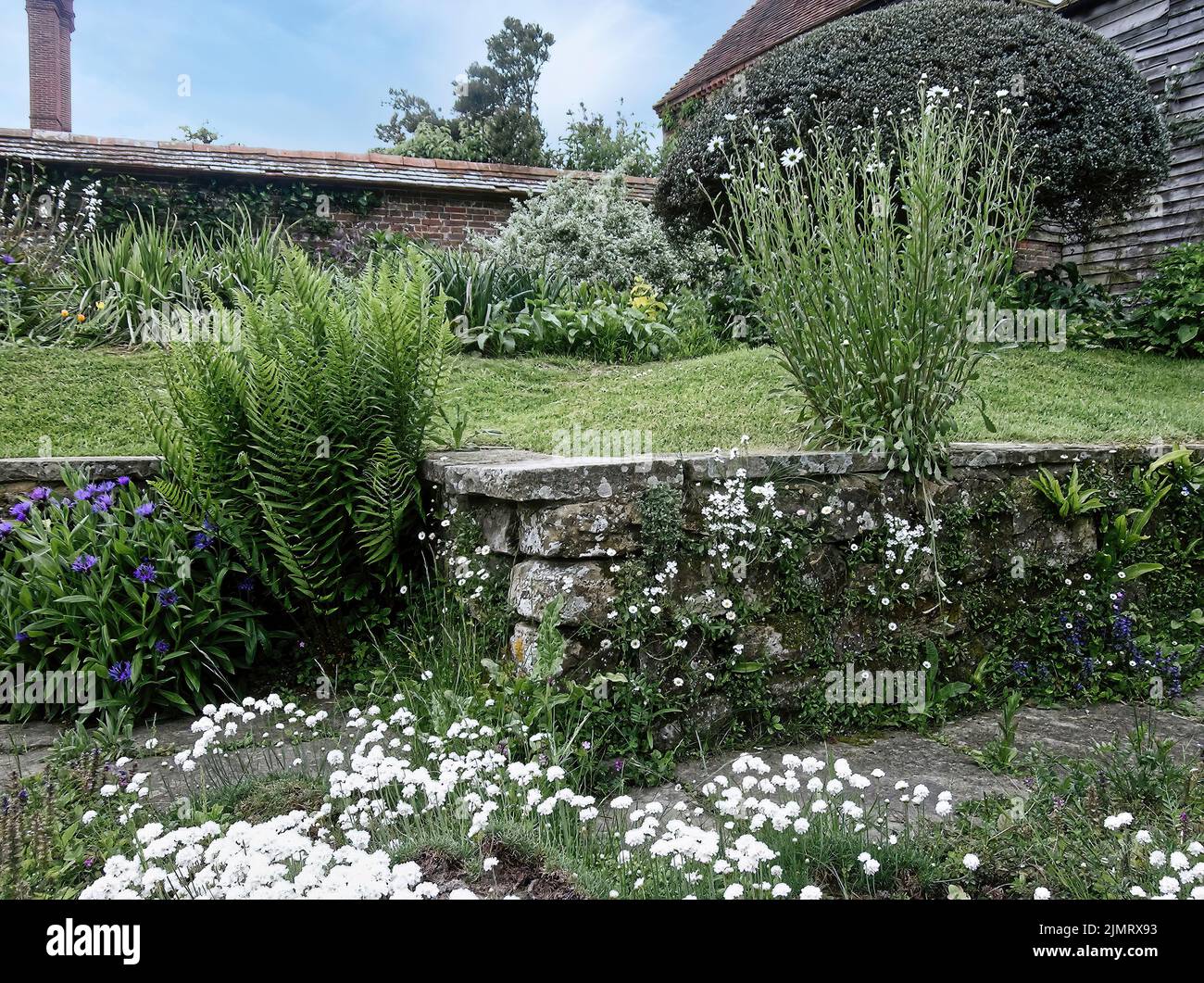 Great Dixter is a house and gardens in Northiam, East Sussex, England ...