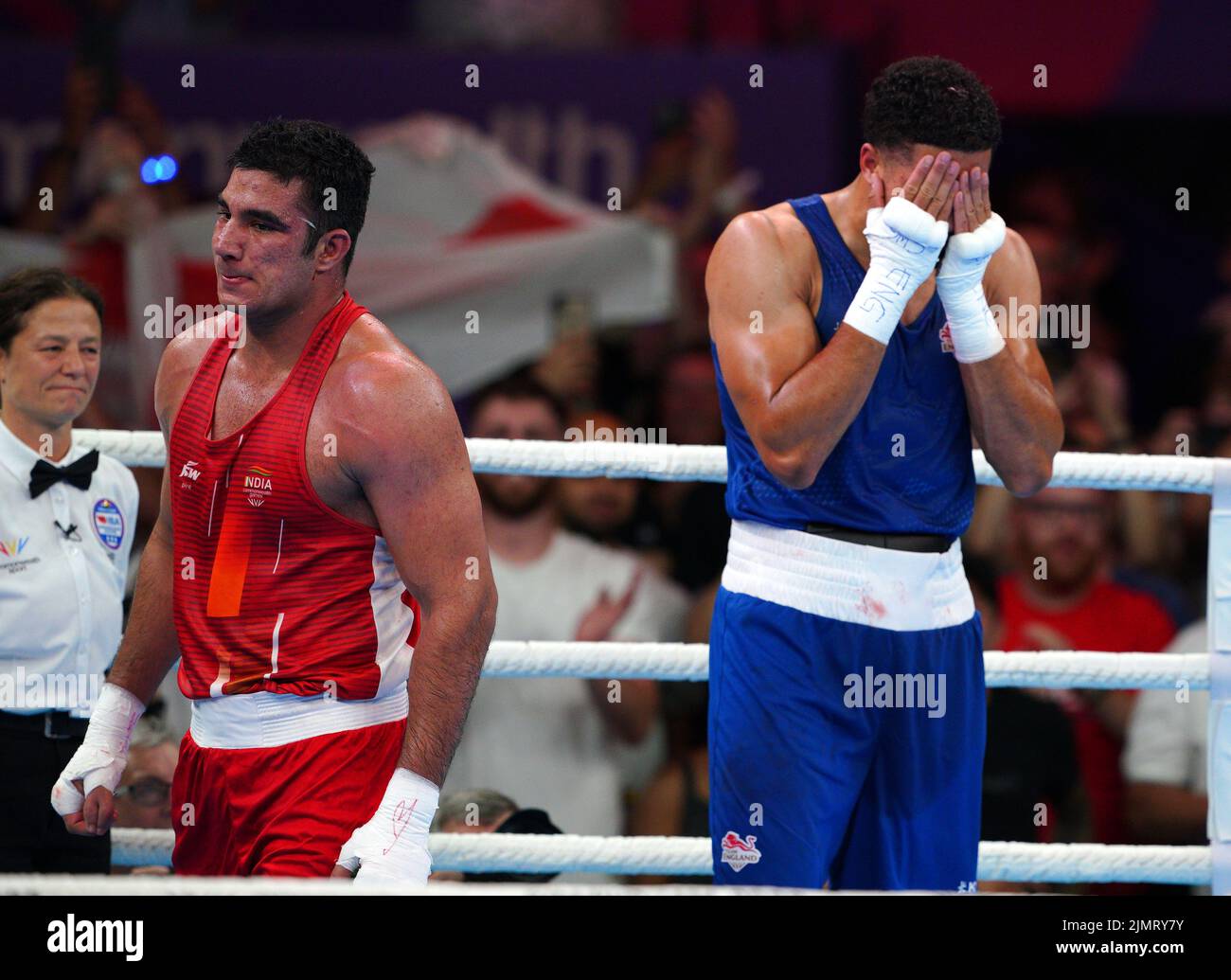 England's Delicious Orie (right) reacts after winning the Men's Super ...