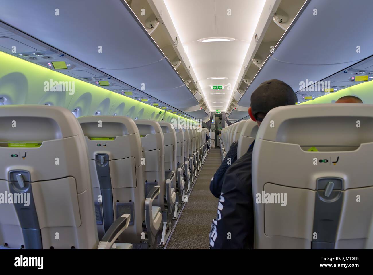 Passengers traveling by plane, inside of an airplane Stock Photo - Alamy