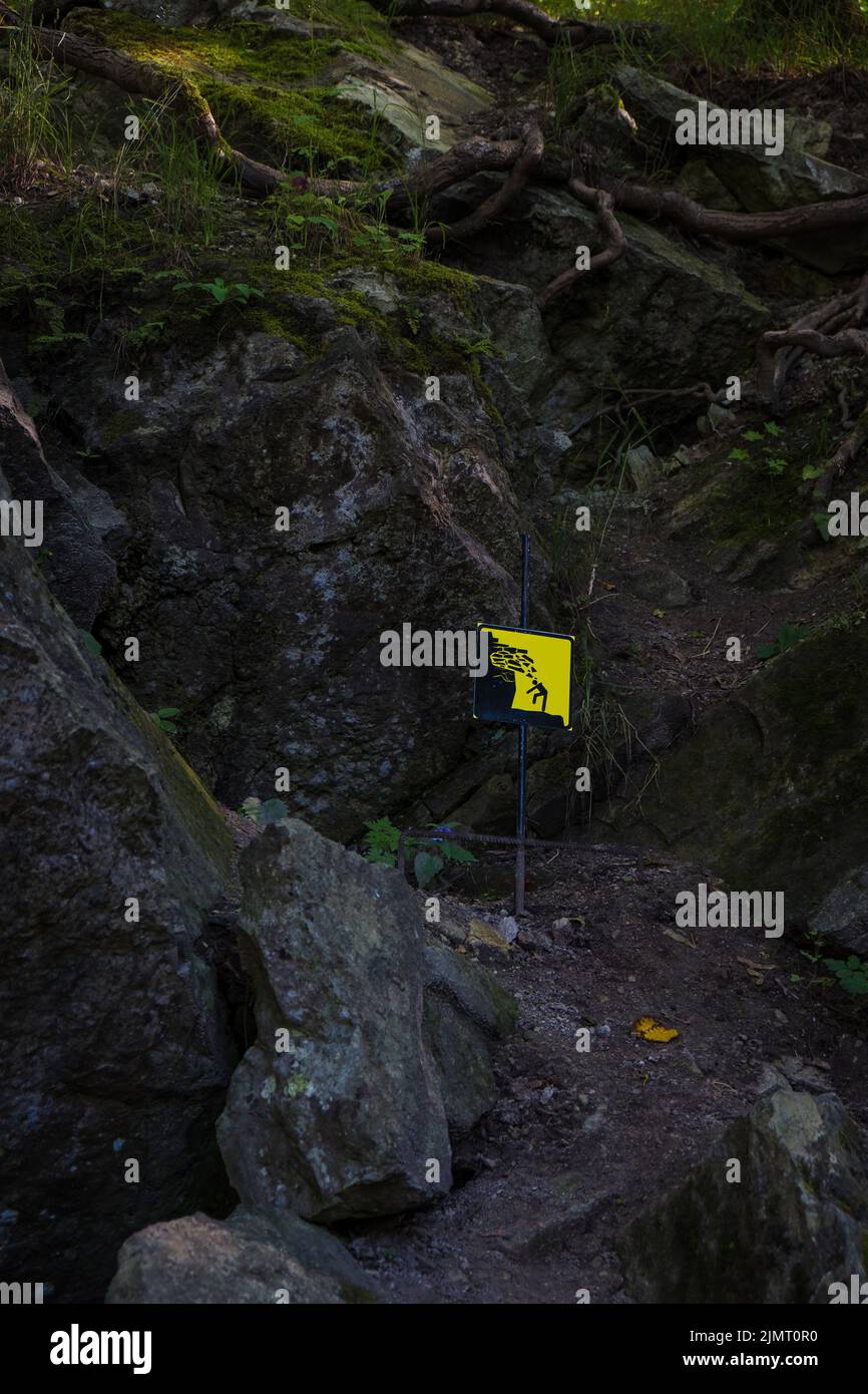 Danger of falling on rocks. No climbing sign in nature Stock Photo - Alamy