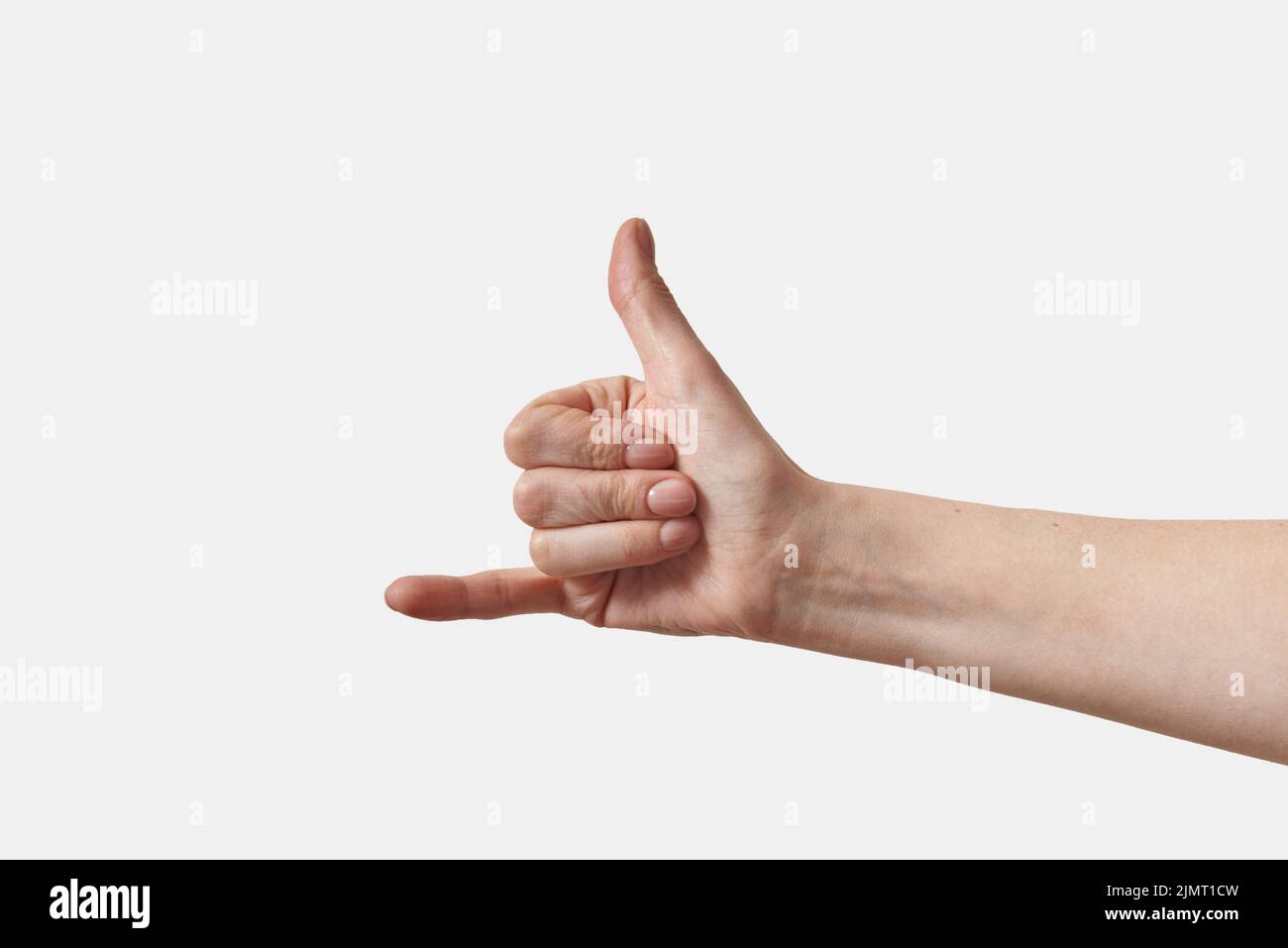 Female hand sign language Y sign on white Stock Photo - Alamy